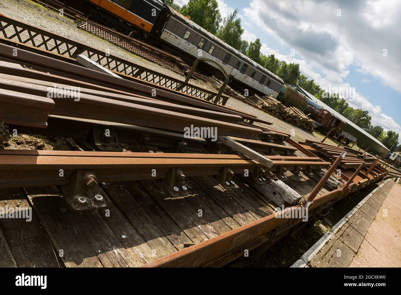 steam railway. Spare rails stored on old rolling stock. Speyside ...