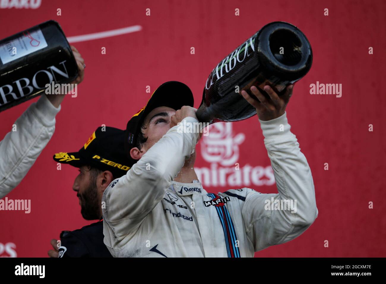Lance Stroll (CDN) Williams celebrates his third position on the podium ...