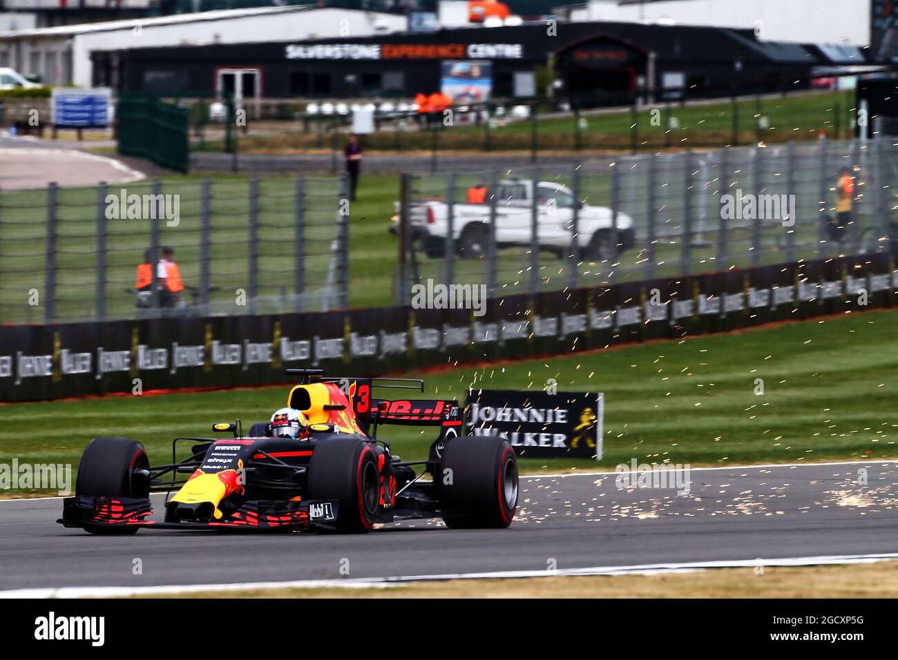 Red bull racing rb13 sends sparks flying hi-res stock photography and ...