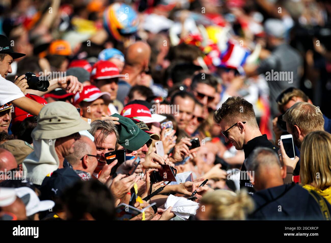 Nico Hulkenberg (GER) Renault Sport F1 Team signs autographs for the ...