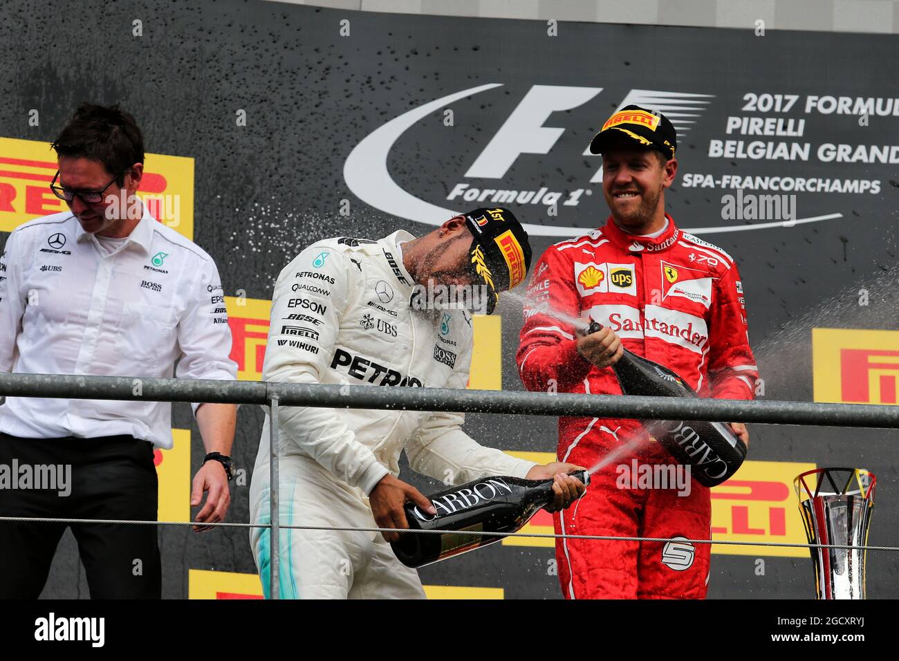 (L to R): Race winner Lewis Hamilton (GBR) Mercedes AMG F1 celebrates ...
