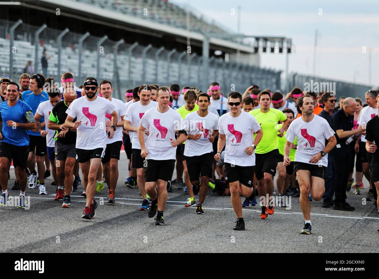 The Renault Sport F1 Team and other members of the paddock run the ...