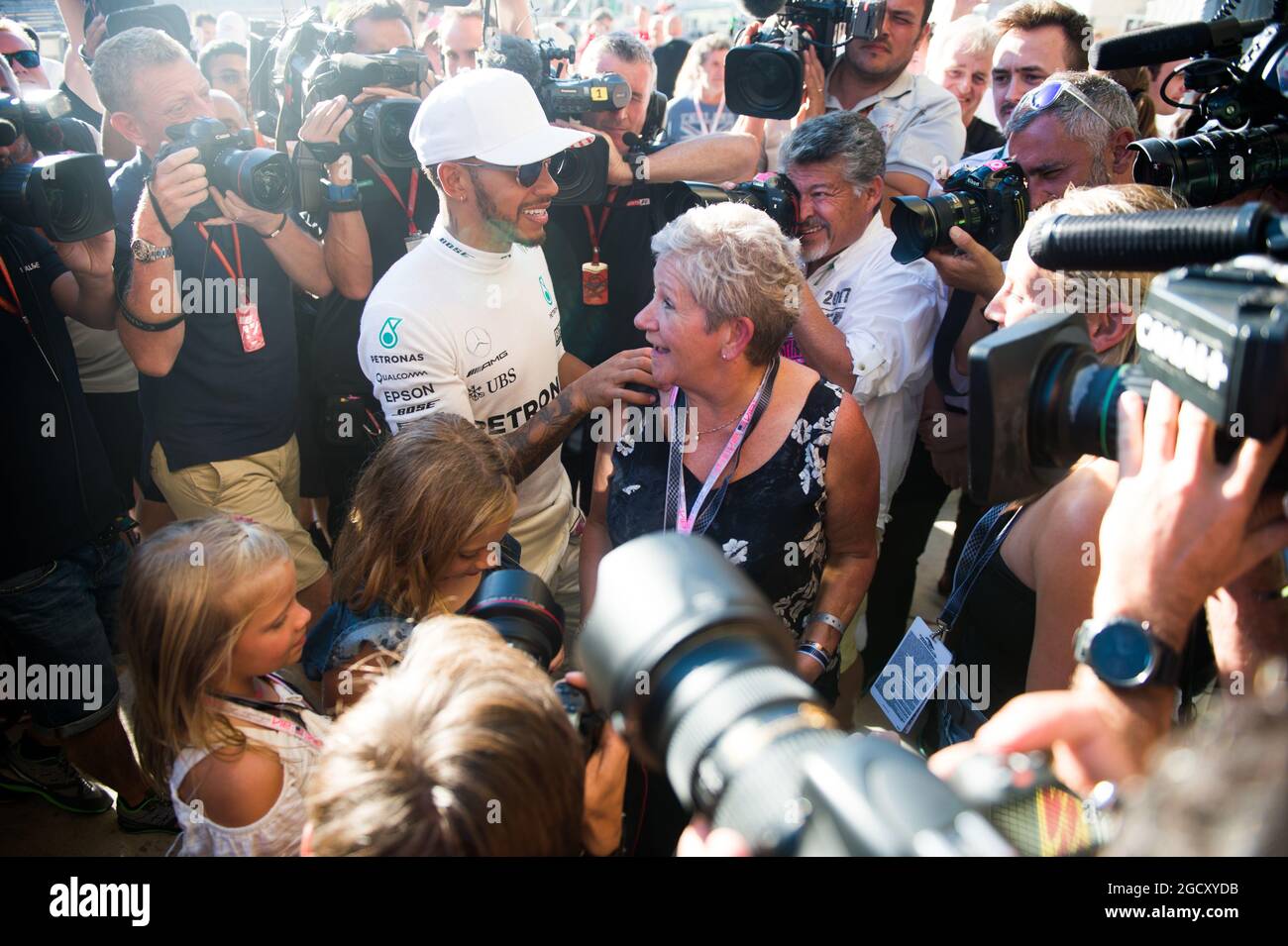 Lewis Hamilton (GBR) Mercedes AMG F1 with his family at post race ...