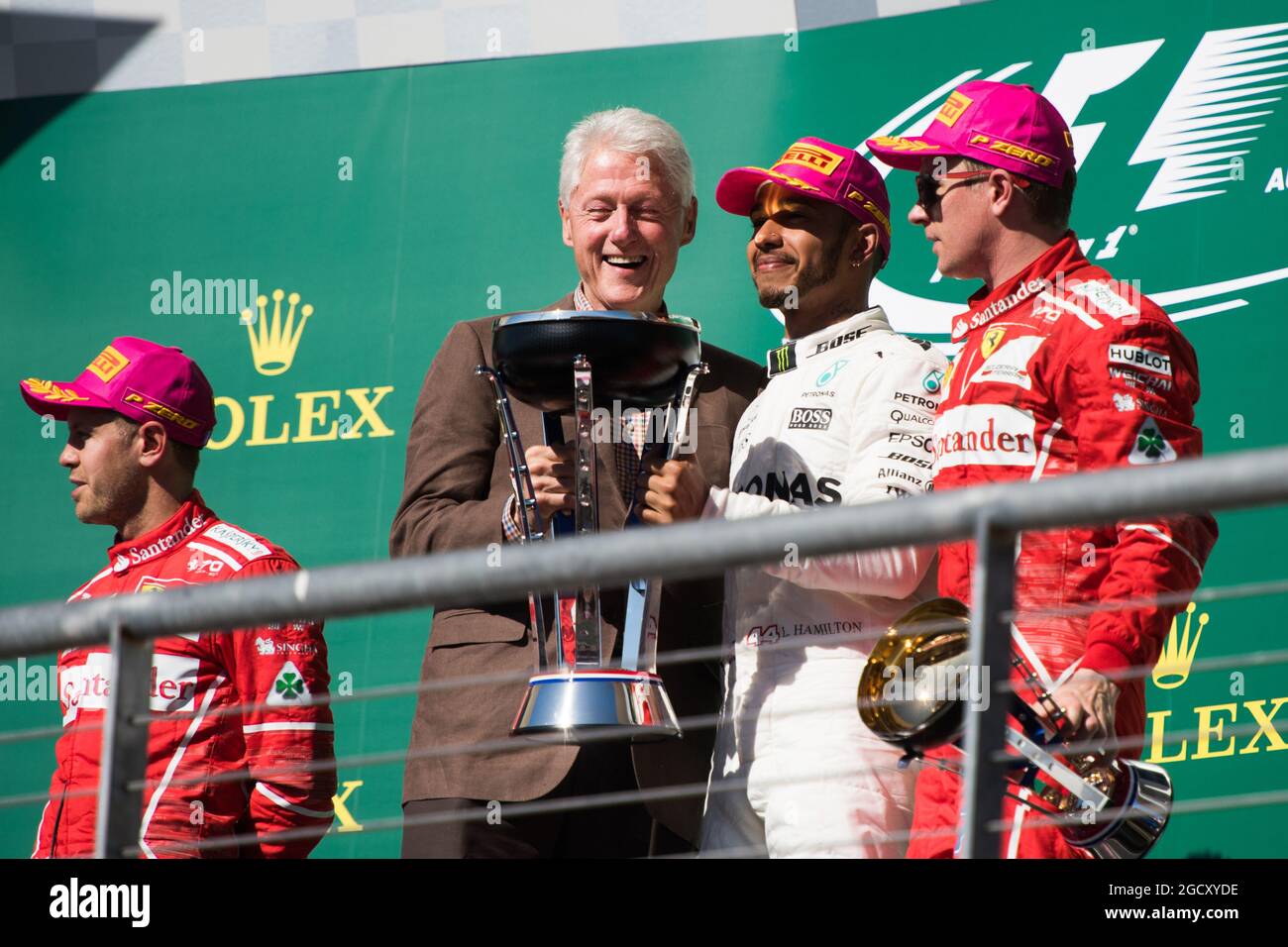 (L to R): Bill Clinton (USA) Former US President on the podium with ...