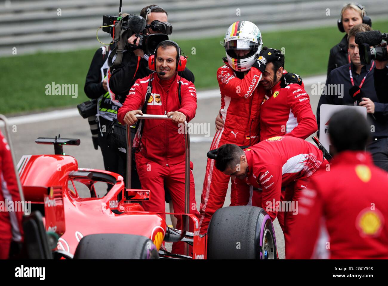 Ferrari celebrates his pole position team hi-res stock photography and ...