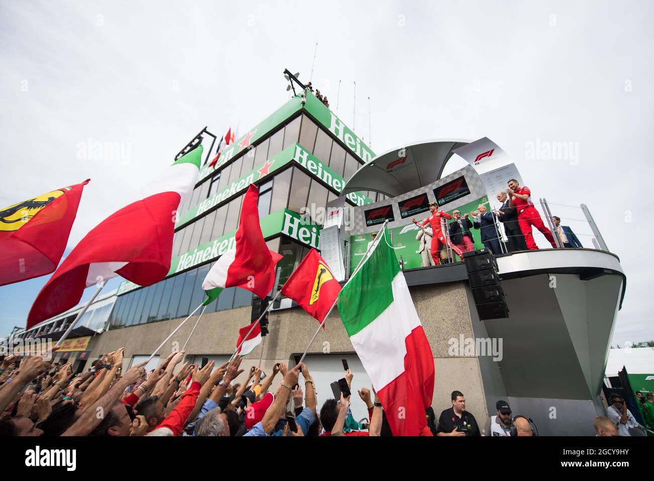 Race winner Sebastian Vettel (GER) Ferrari celebrates on the podium ...
