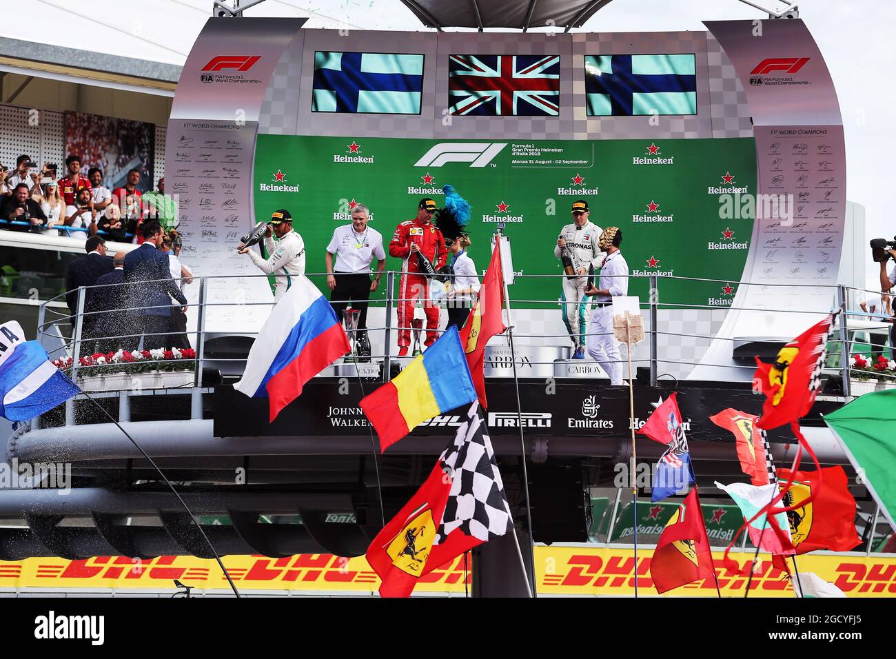 The podium: Kimi Raikkonen (FIN) Ferrari, second; Lewis Hamilton (GBR ...