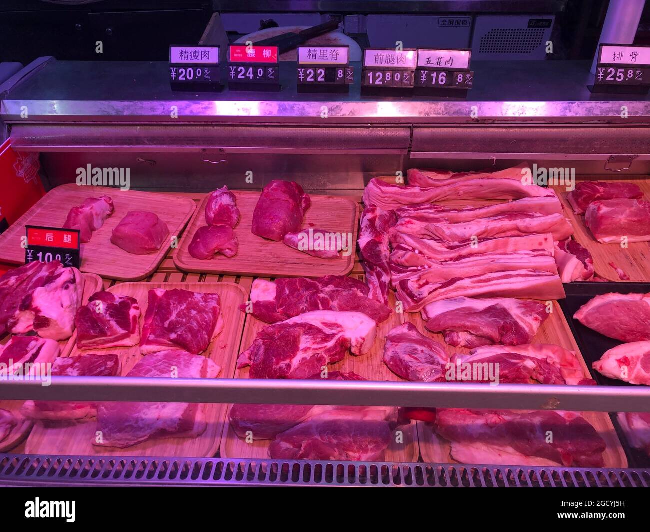 Chengdu, China. 10th Aug, 2021. People shop for food at a food market ...