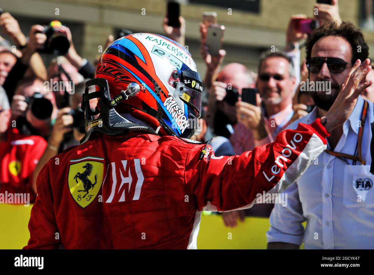 Race winner Kimi Raikkonen (FIN) Ferrari celebrates in parc ferme ...