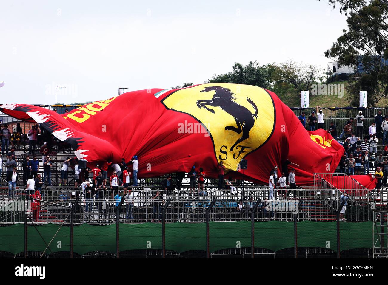 Large Ferrari flag with fans in the grandstand. Brazilian Grand Prix ...