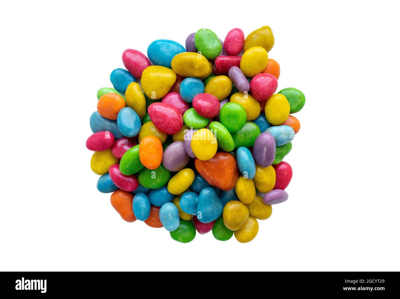 Pile of colorful candy dragee, multi-colored glazed raisins isolated on ...