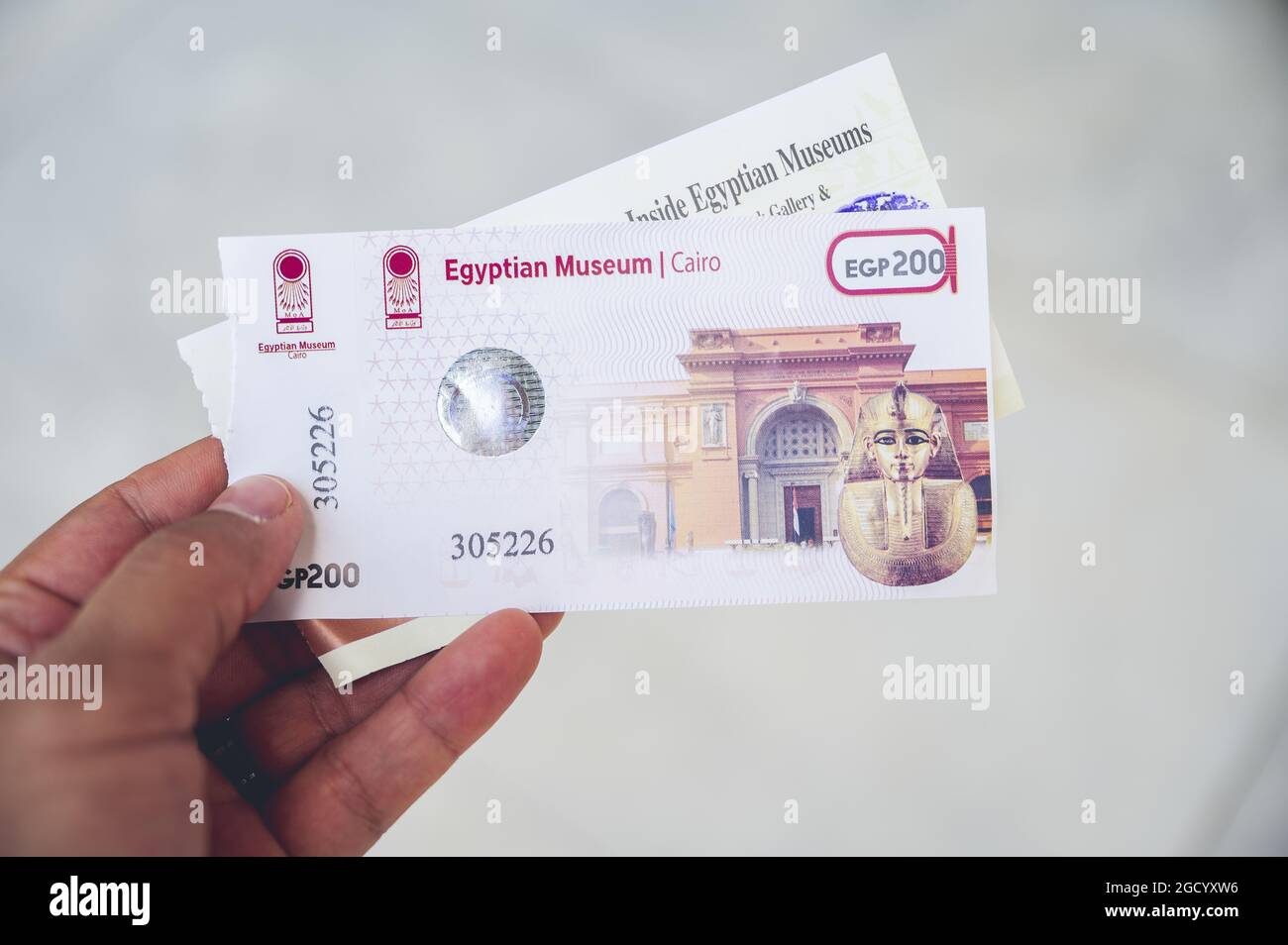 CAIRO, EGYPT - Jun 06, 2021: A closeup of a person holding tickets to ...