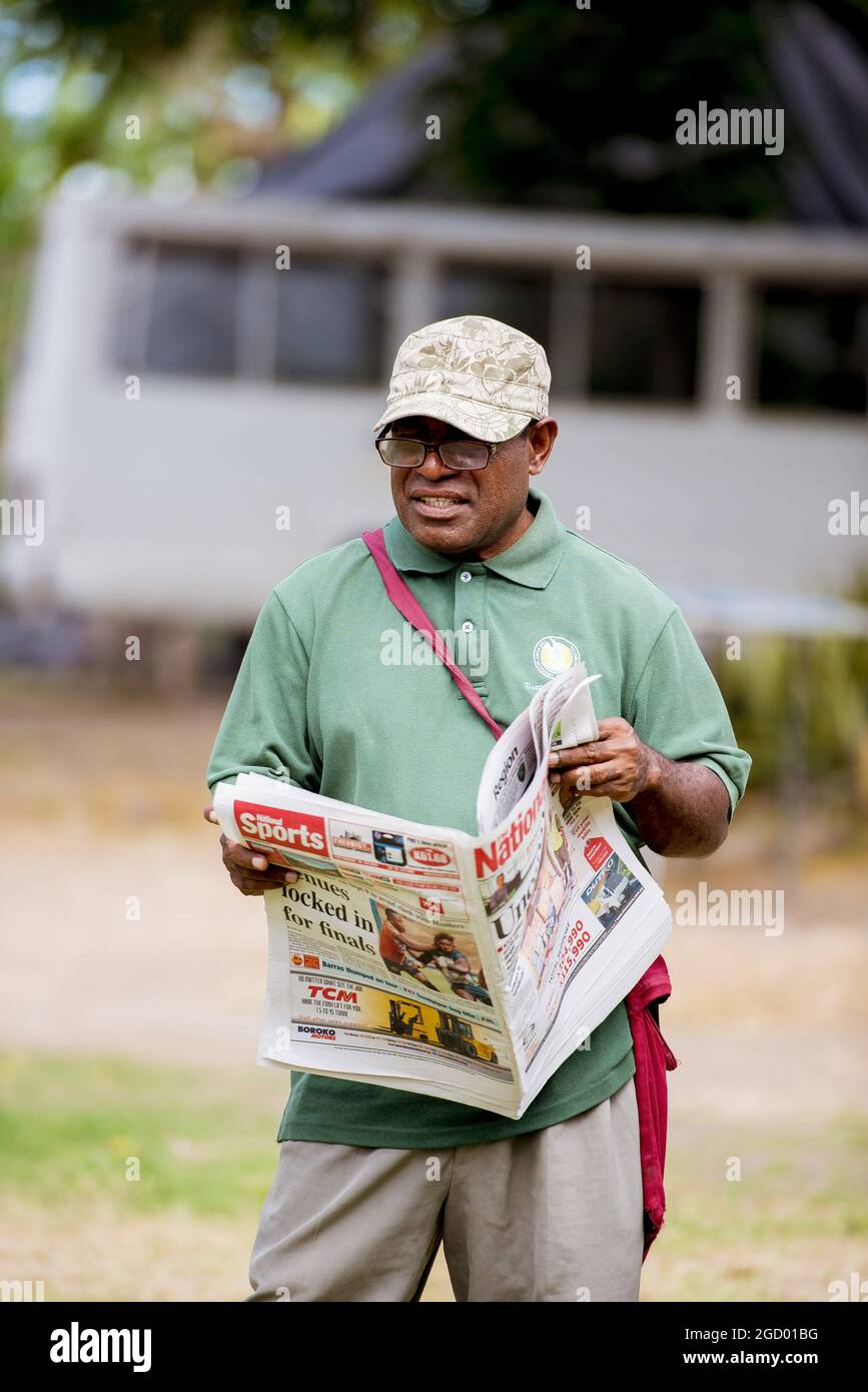 PORT MORESBY, PAPUA NEW GUINEA - May 06, 2018: A vertical shot of a man ...