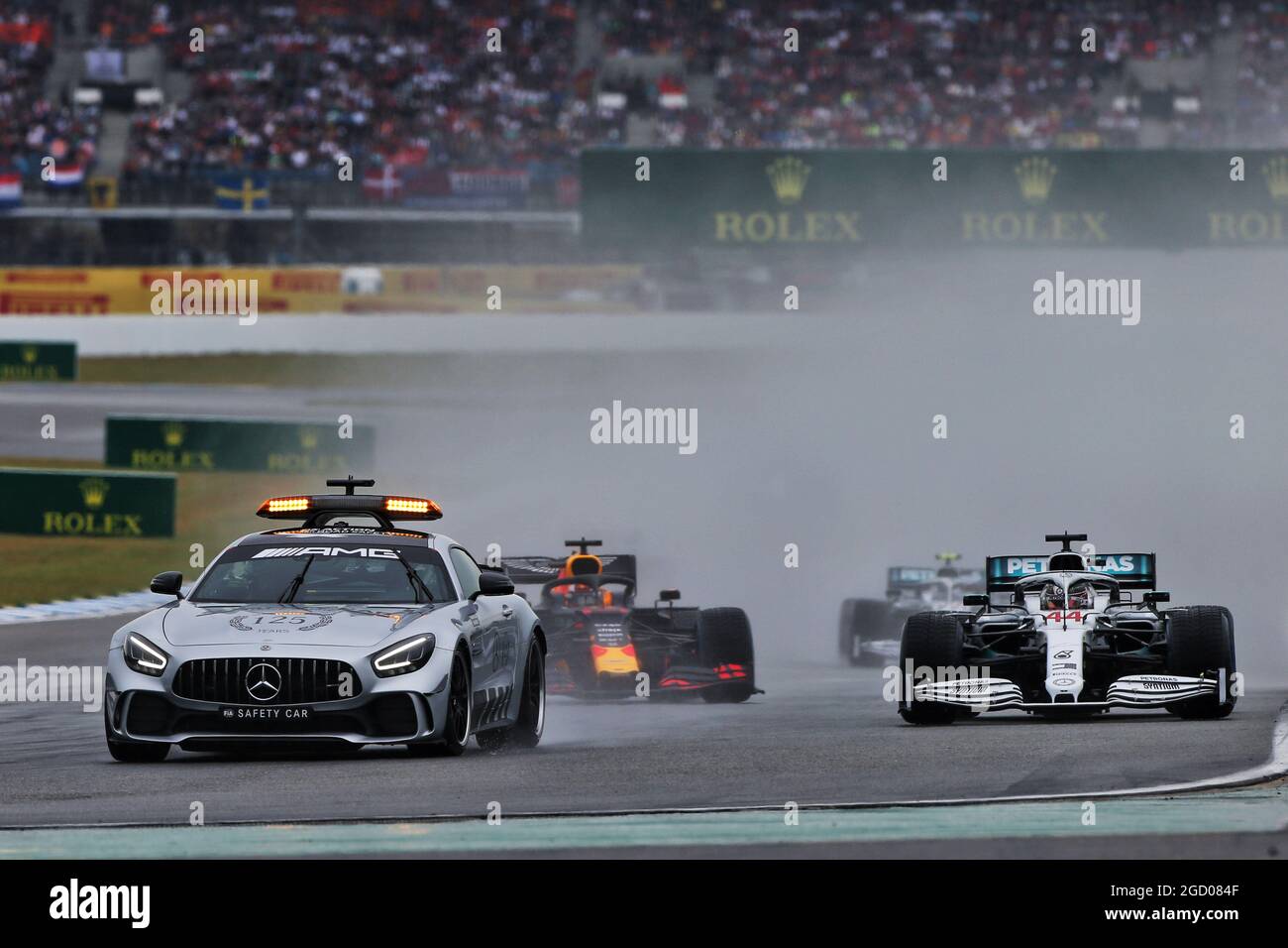 Lewis Hamilton (GBR) Mercedes AMG F1 W10 leads behind the FIA Safety ...