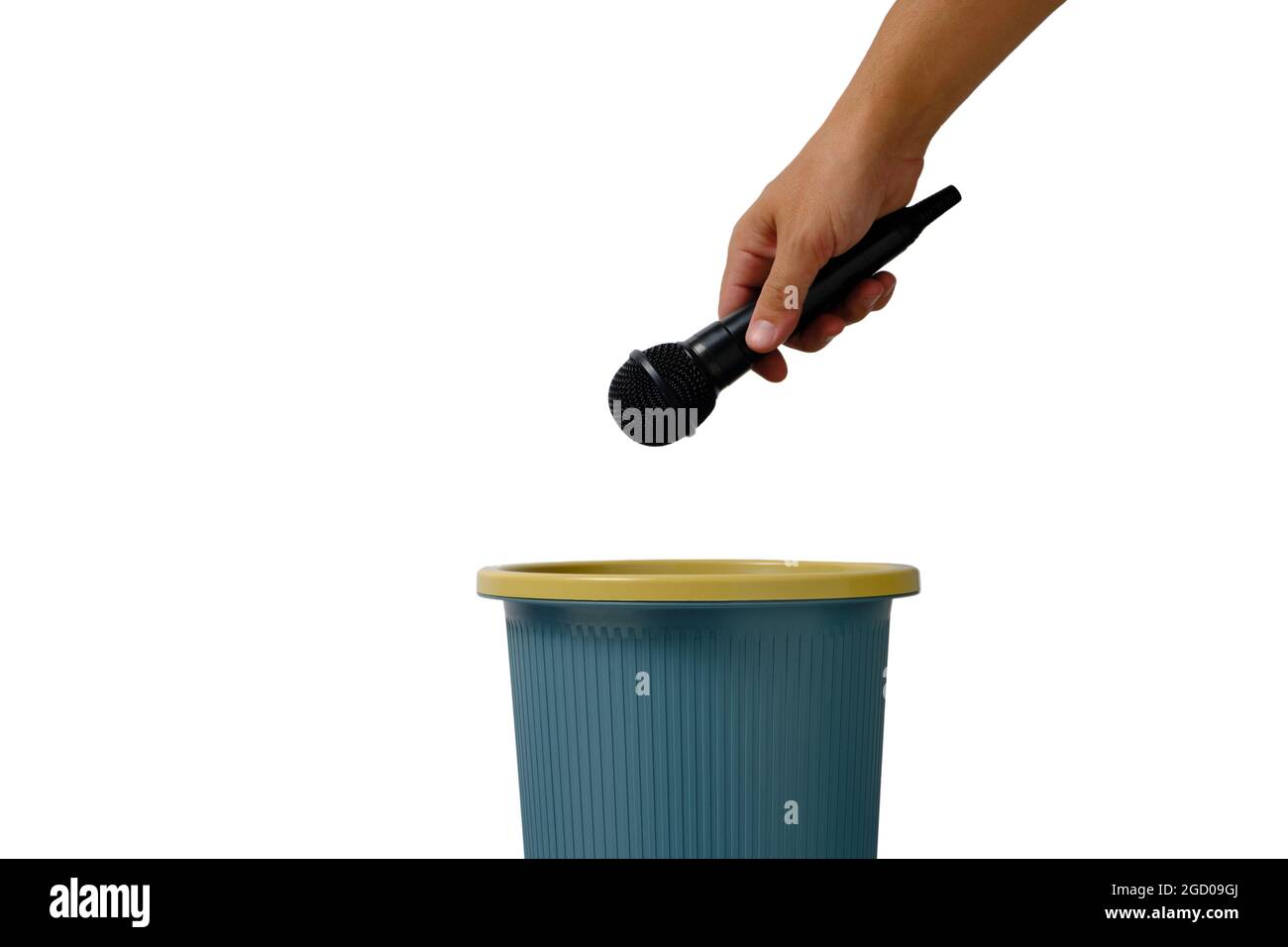 Sound microphone for vocal singing is thrown into trash, on white ...