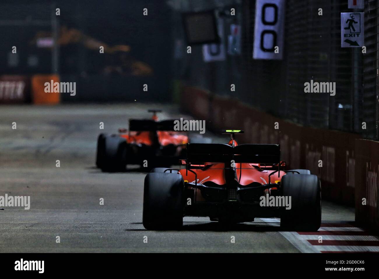 Sebastian Vettel (GER) Ferrari SF90 leads team mate Charles Leclerc ...
