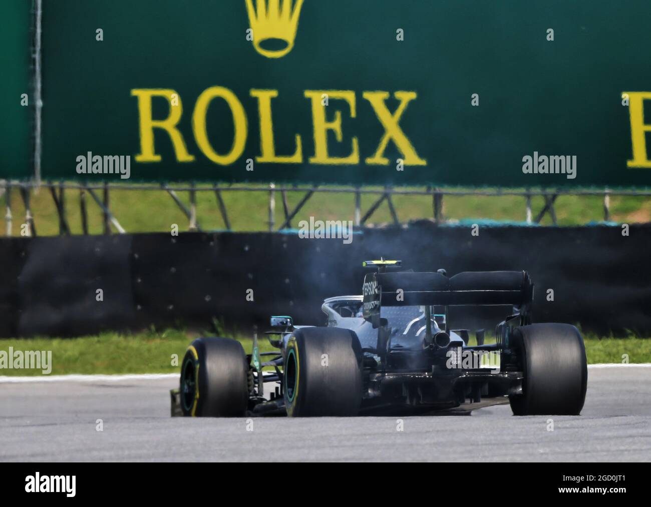 Mercedes amg f1 w10 a smoking engine hi-res stock photography and ...