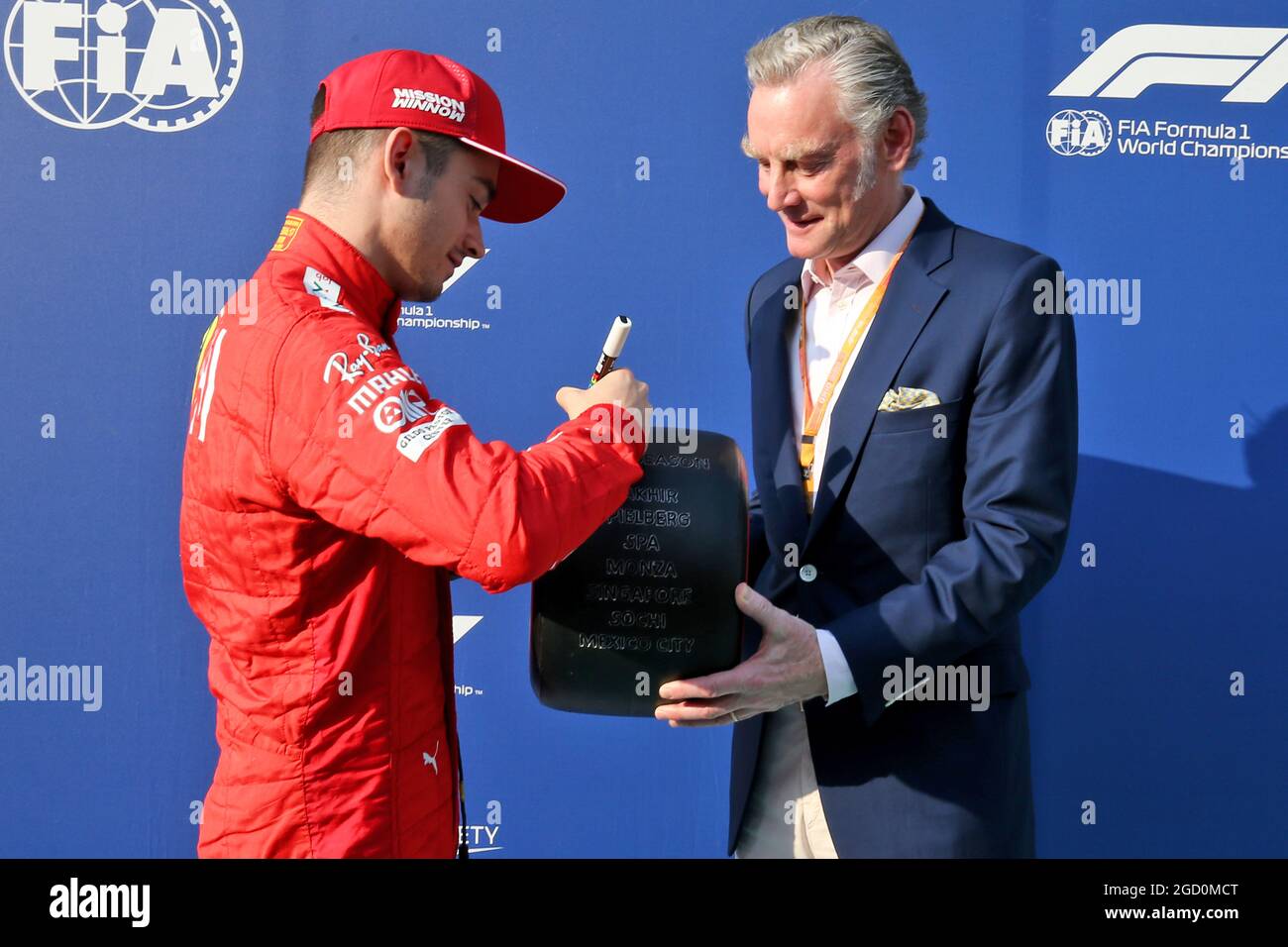 Charles Leclerc (MON) Ferrari with Sean Bratches (USA) Formula 1 ...