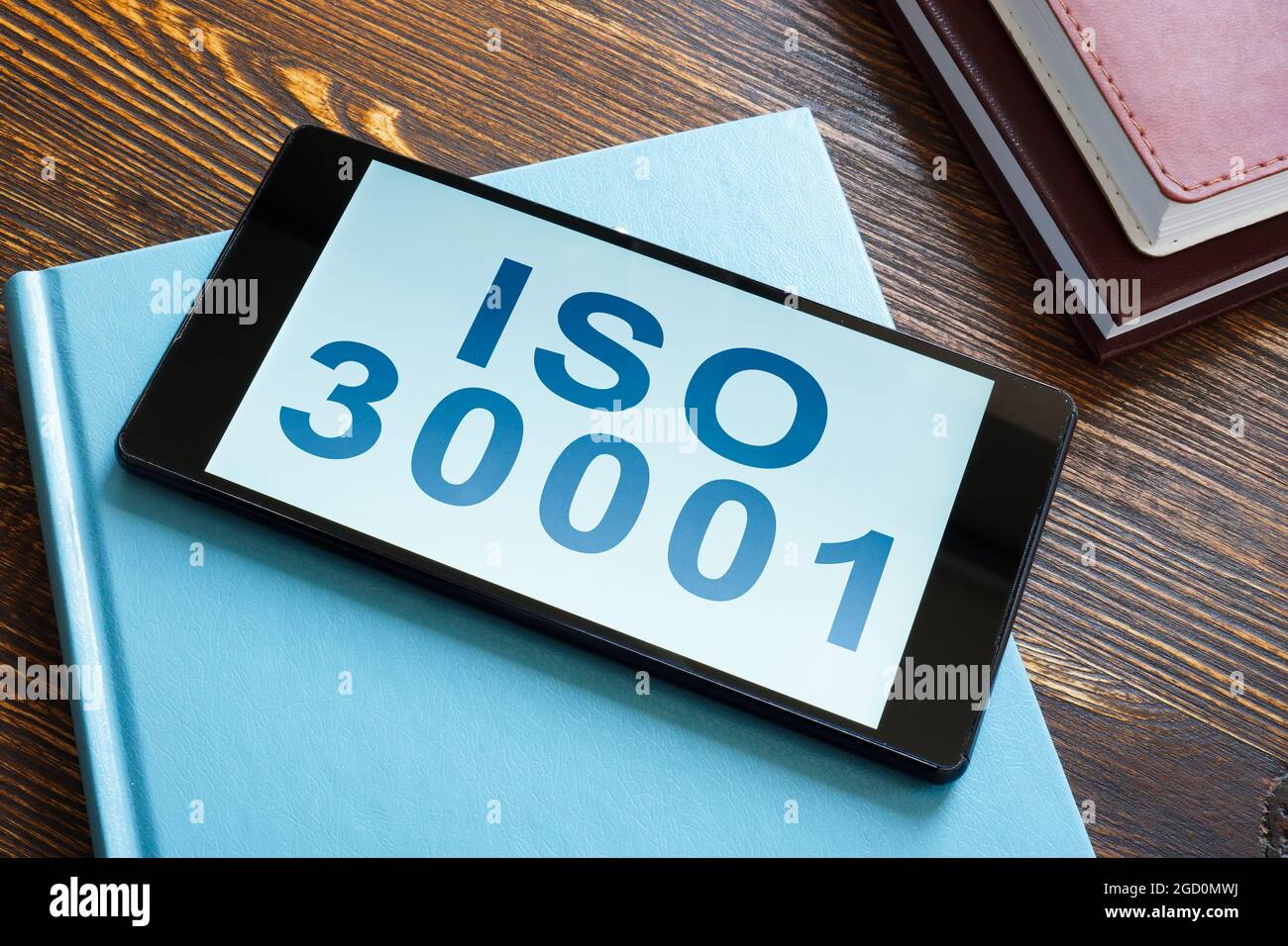 Data about ISO 30001 on the screen of smartphone Stock Photo - Alamy