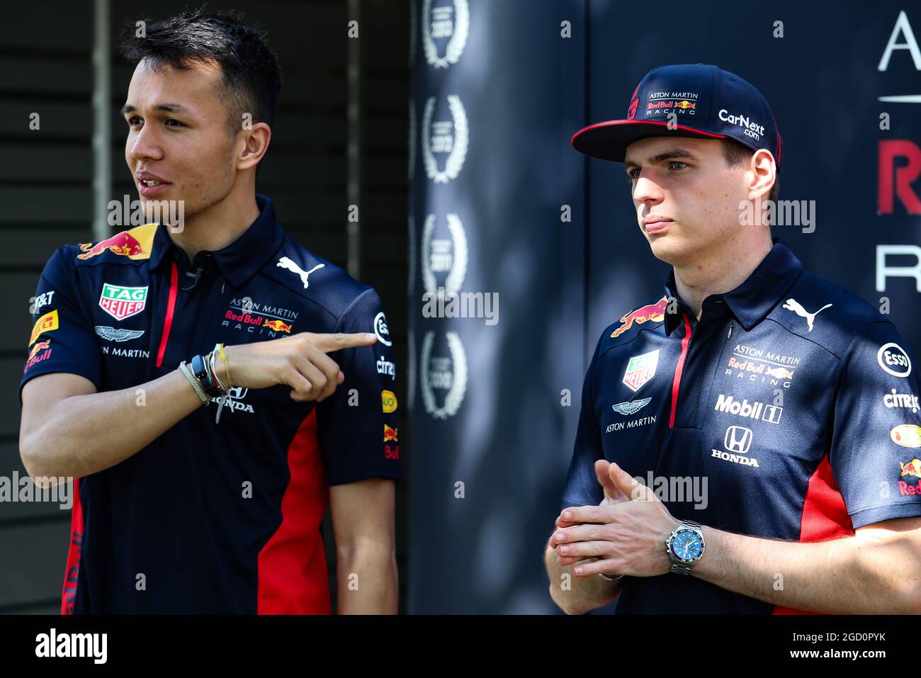 (L to R): Alexander Albon (THA) Red Bull Racing with Max Verstappen ...