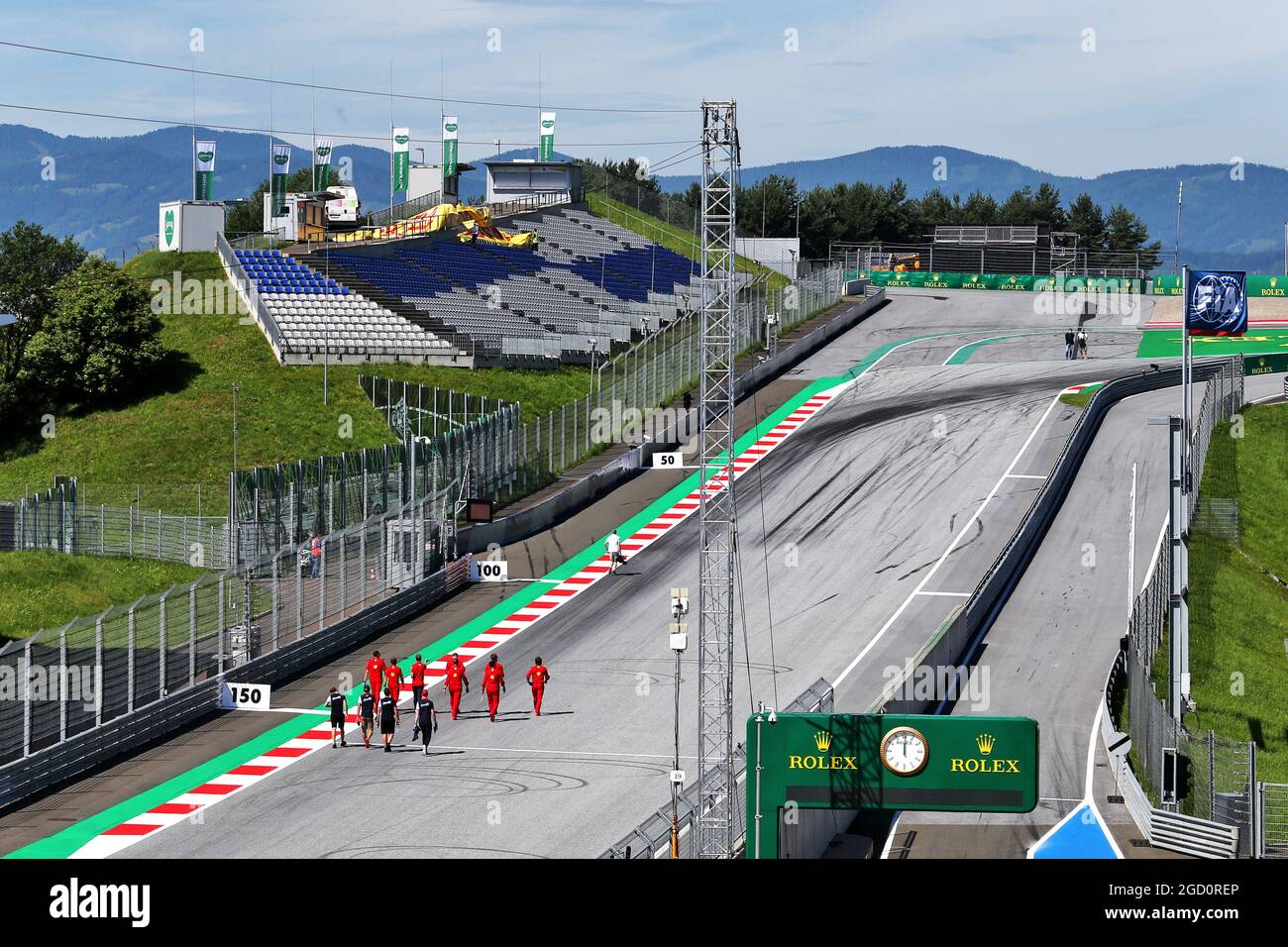 Circuit atmosphere - Ferrari team walk the circuit. Austrian Grand Prix ...