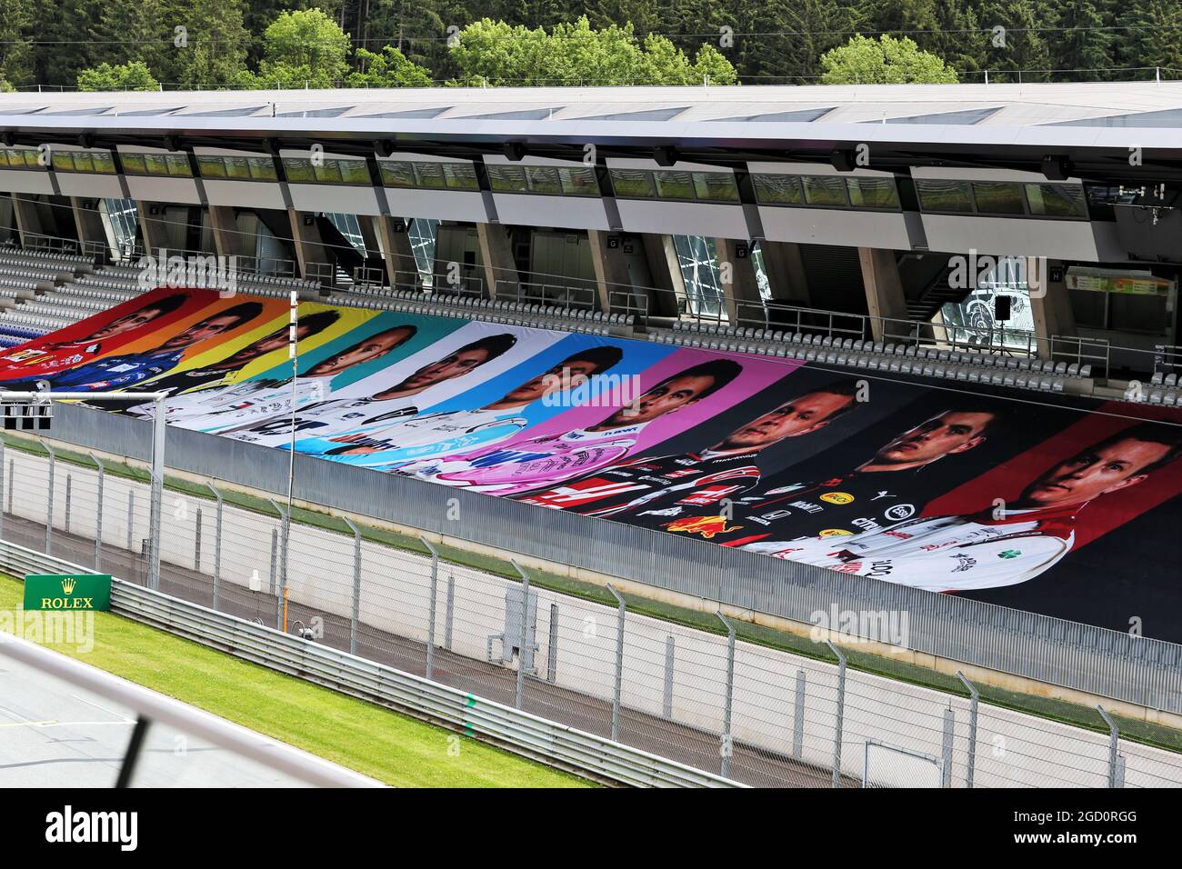 Circuit atmosphere - empty grandstand covered with pictures of the ...