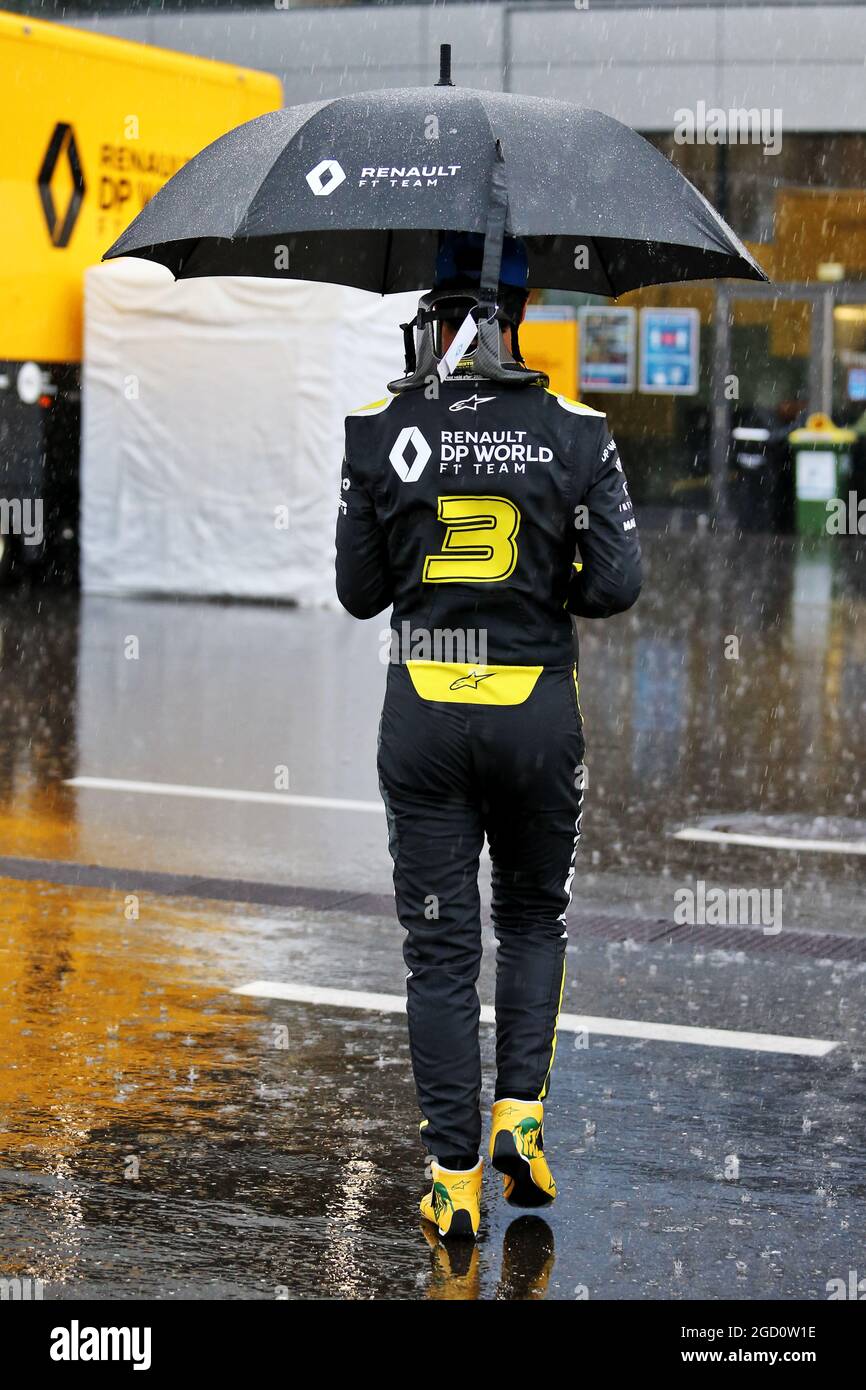 Daniel Ricciardo (AUS) Renault F1 Team - heavy rain in the paddock ...