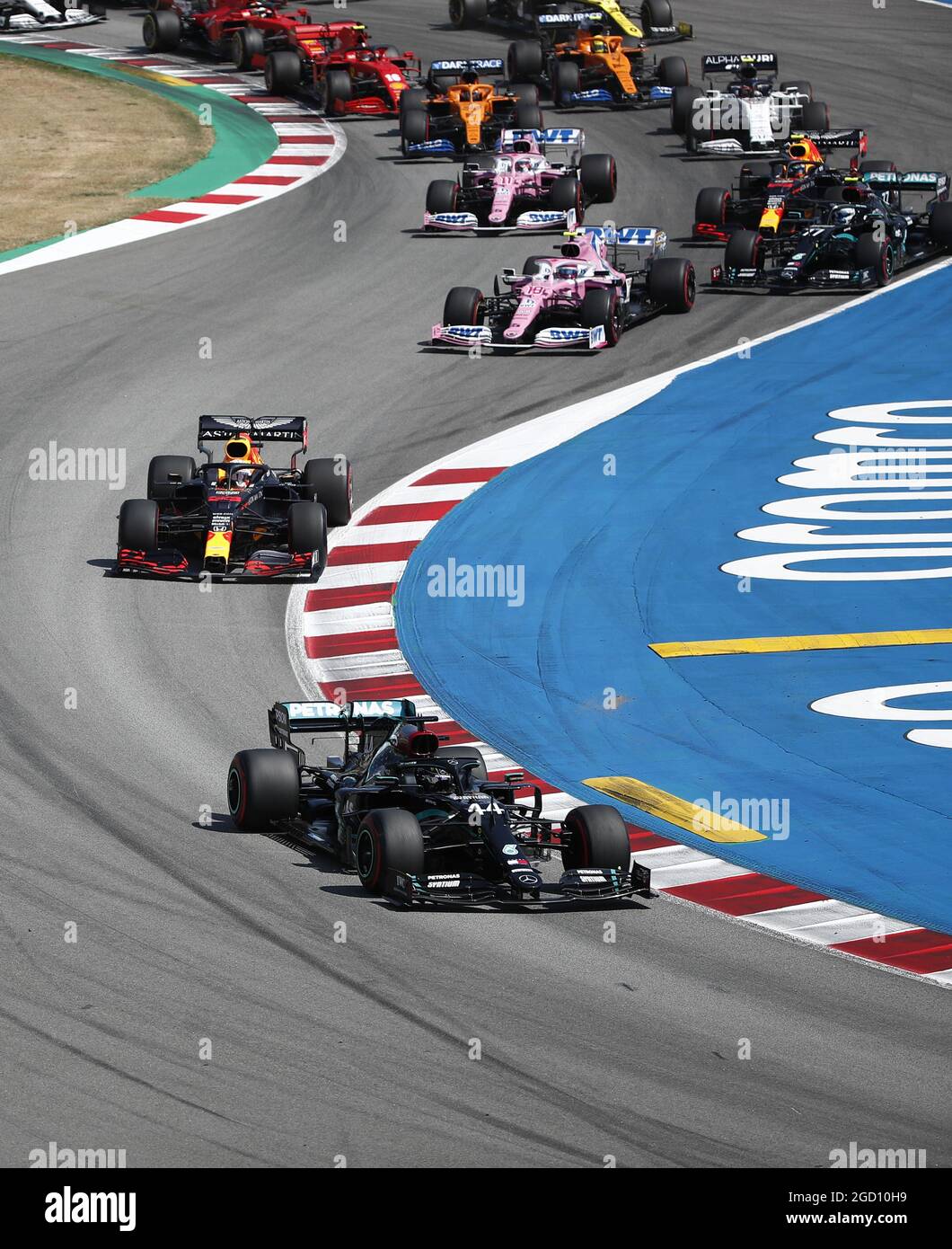 Lewis Hamilton (GBR) Mercedes AMG F1 W11 leads at the start of the race ...