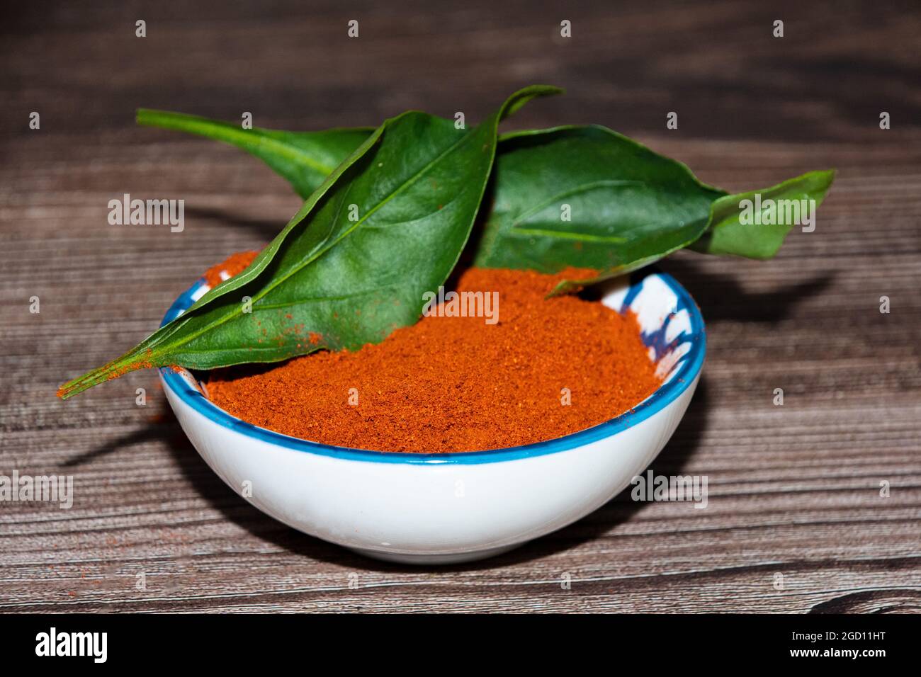 fresh grown chilli peppers and ground chilli Stock Photo - Alamy