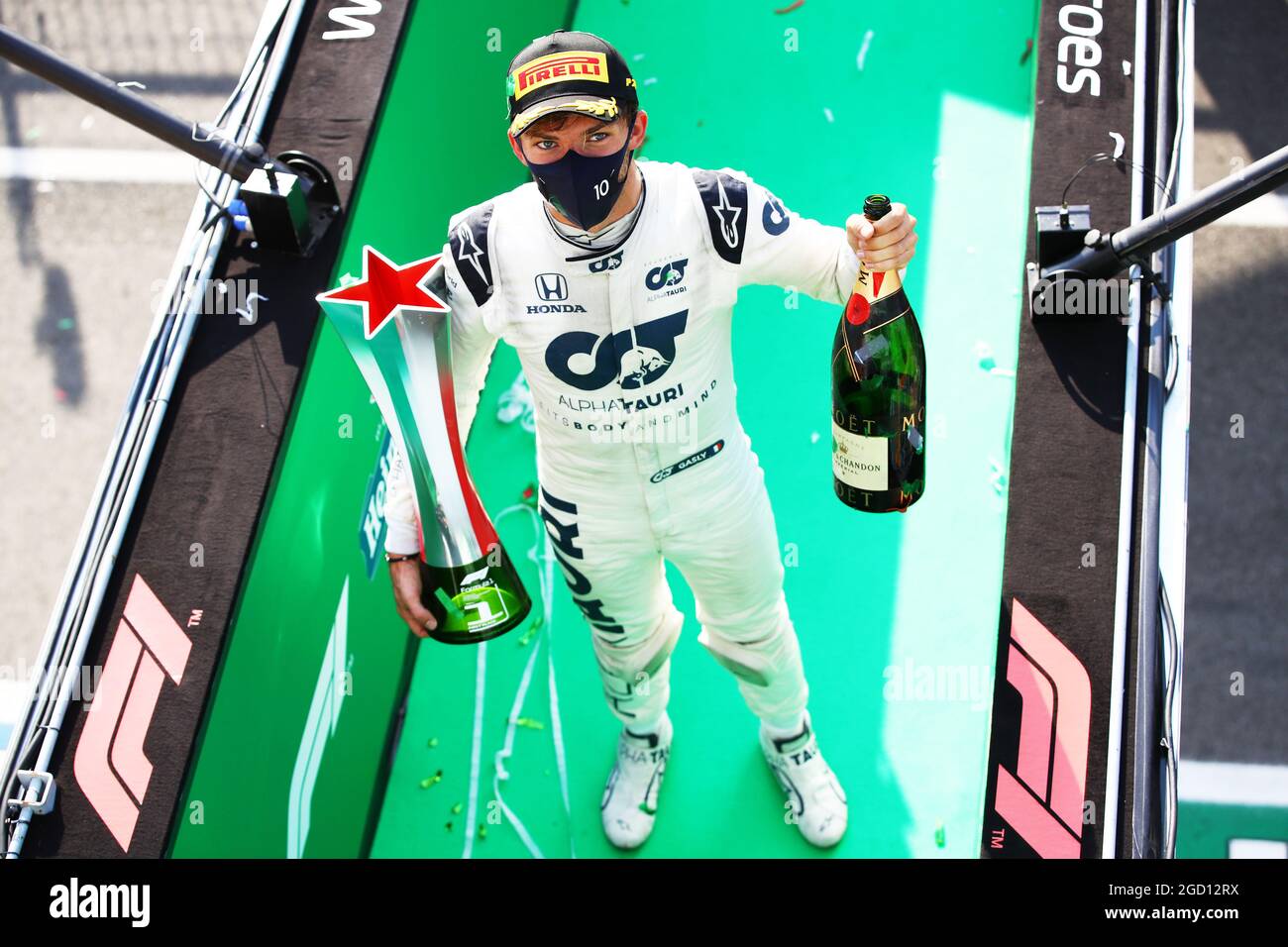 Race winner Pierre Gasly (FRA) AlphaTauri celebrates on the podium ...