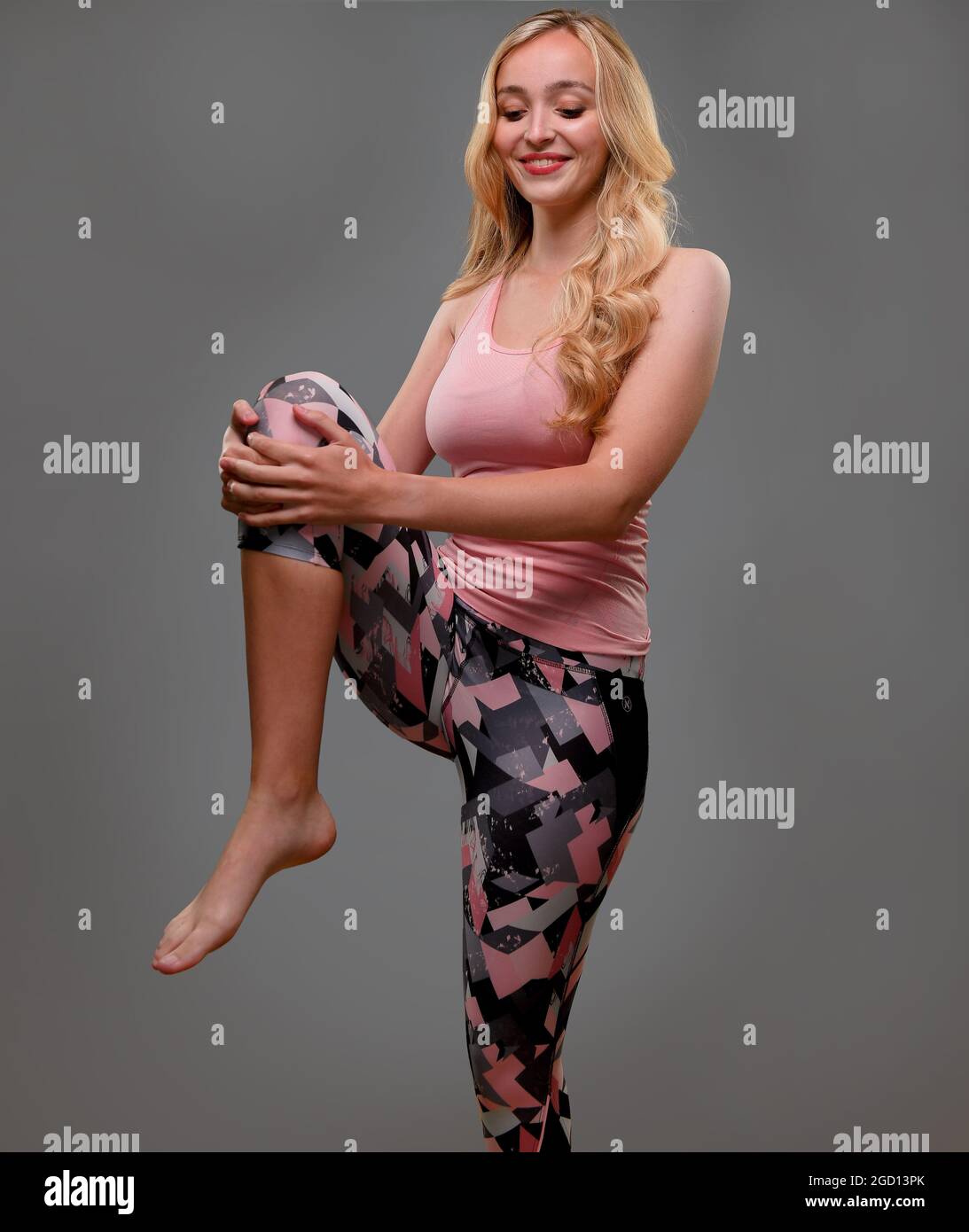 Women in yoga poses hi-res stock photography and images - Alamy