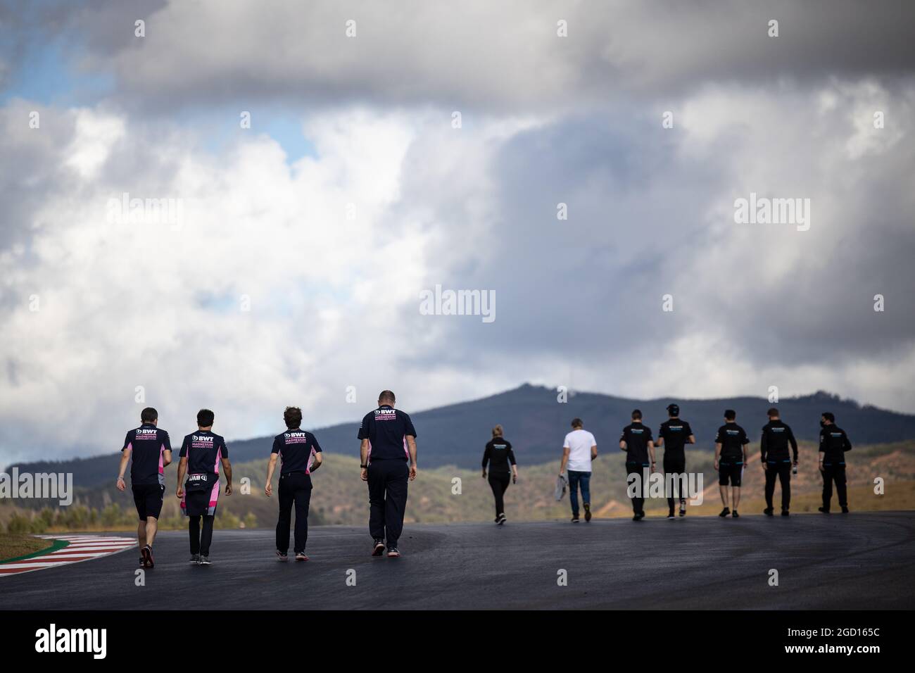 Sergio Perez (MEX) Racing Point F1 Team walks the circuit with the team ...