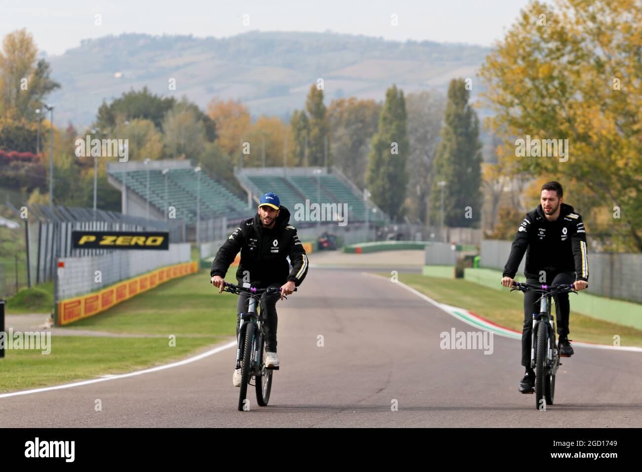 Daniel Ricciardo (AUS) Renault F1 Team rides the circuit with Michael ...