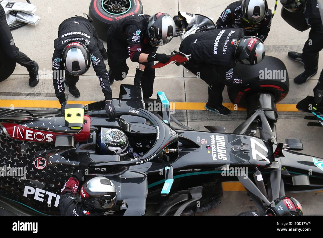 Valtteri Bottas (FIN) Mercedes AMG F1 W11 makes a pit stop and has a ...