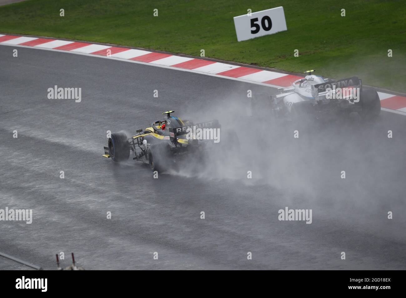 Esteban Ocon (FRA) Renault F1 Team RS20 and Nicholas Latifi (CDN ...