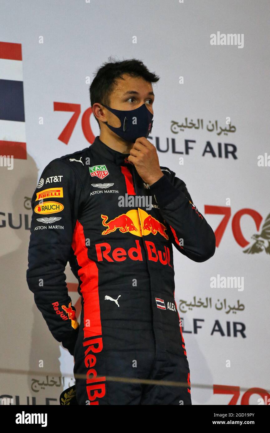 Third placed Alexander Albon (THA) Red Bull Racing on the podium ...