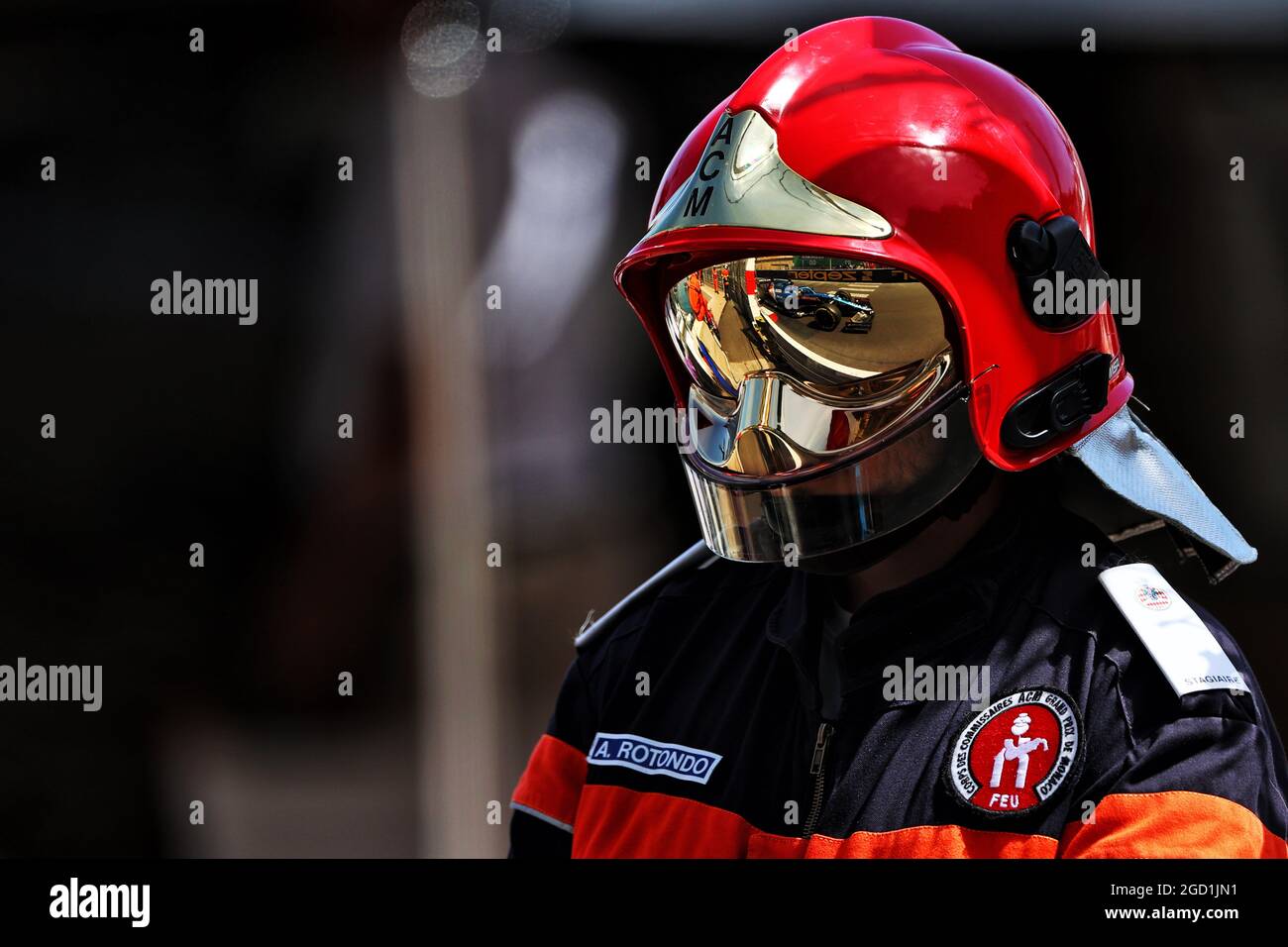Alpine f1 team a521 reflected in a fire marshals helmet hi-res stock ...