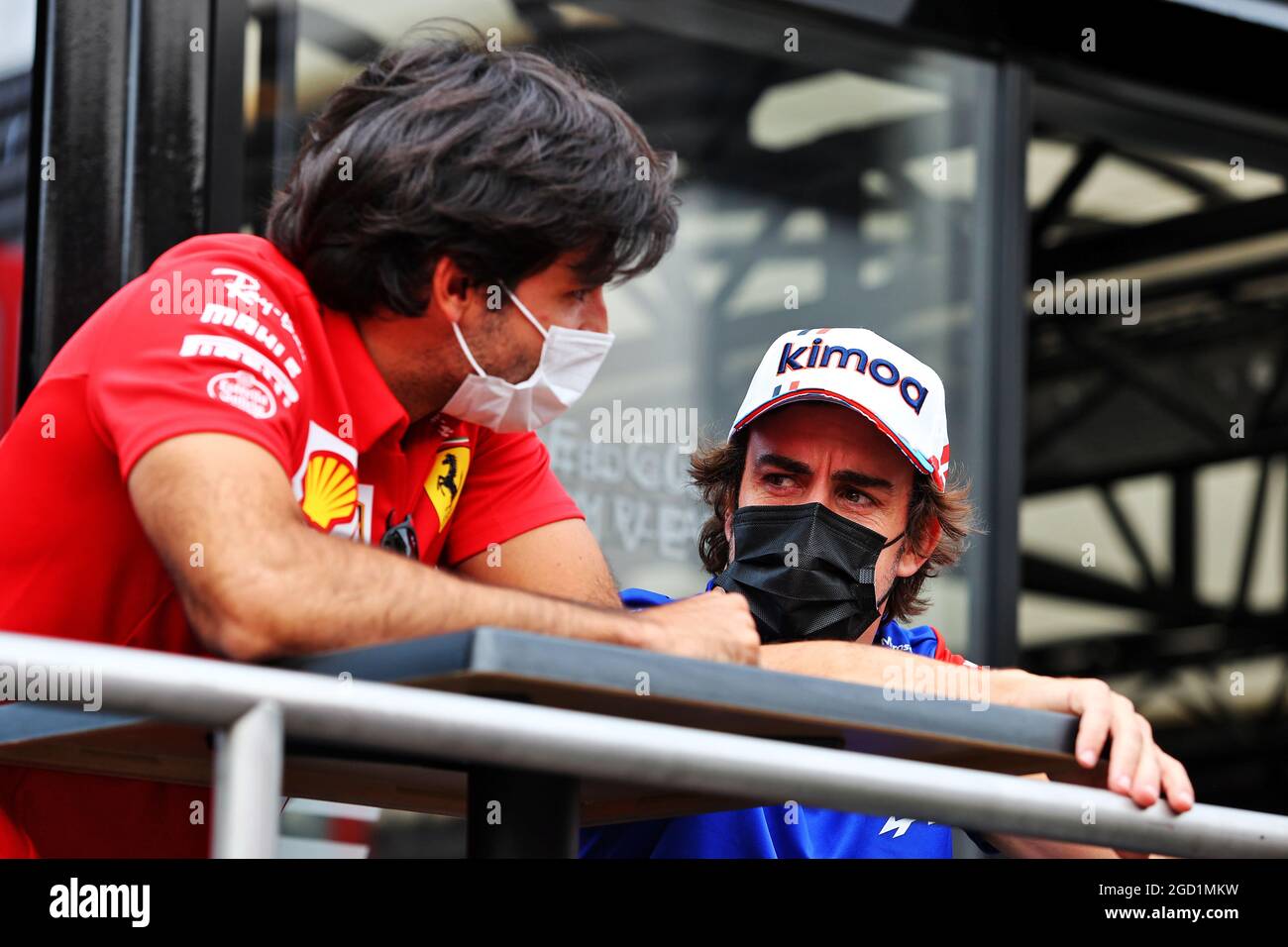 (L to R): Carlos Sainz Jr (ESP) Ferrari with Fernando Alonso (ESP ...