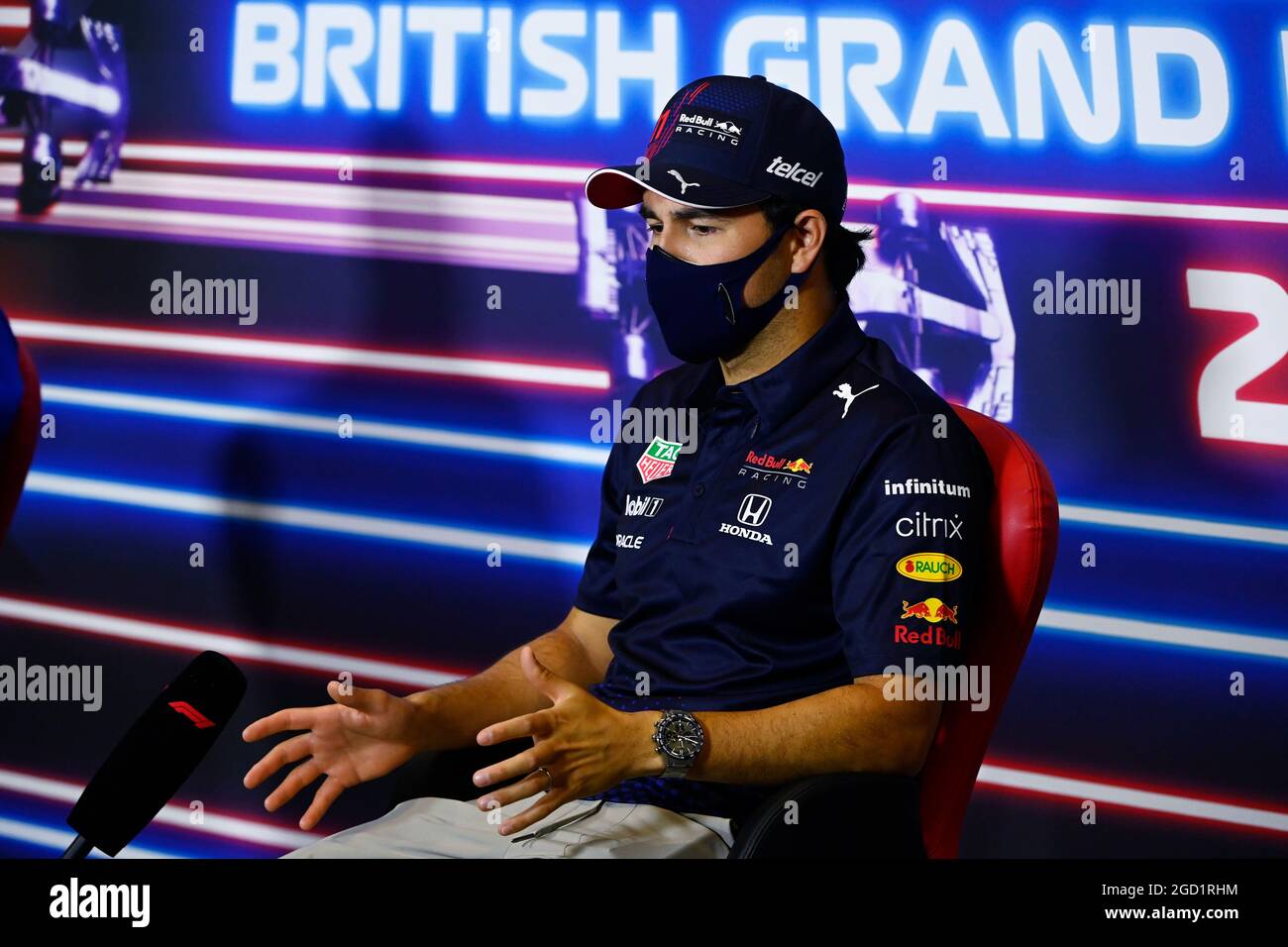 Sergio Perez (MEX) Red Bull Racing in the FIA Press Conference. British ...