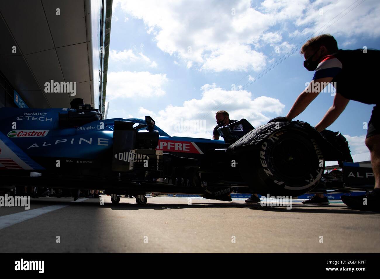 Alpine f1 team a521 pushed back into pit garage hi-res stock ...