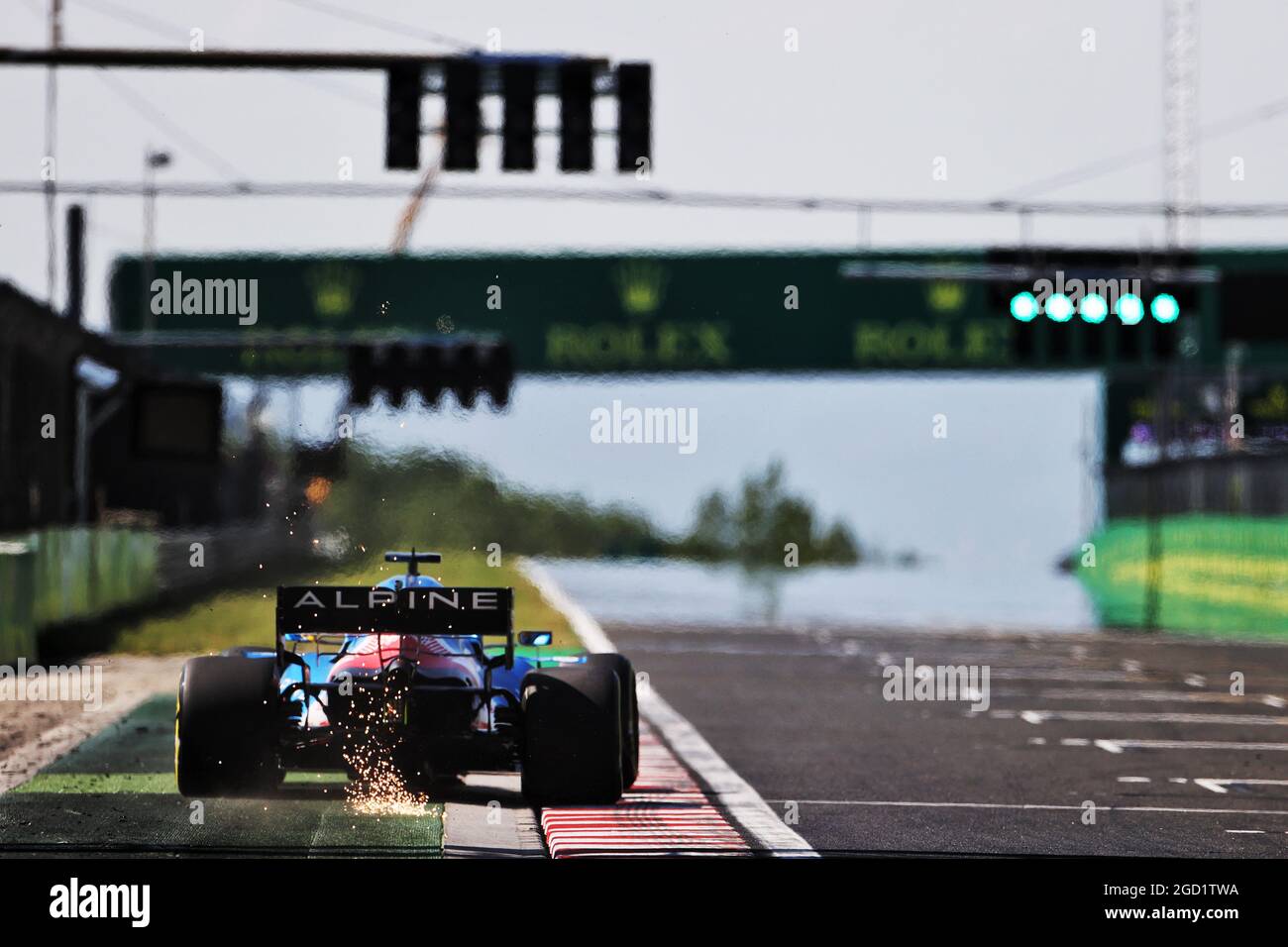 Alpine f1 team a521 sends sparks flying hi-res stock photography and ...