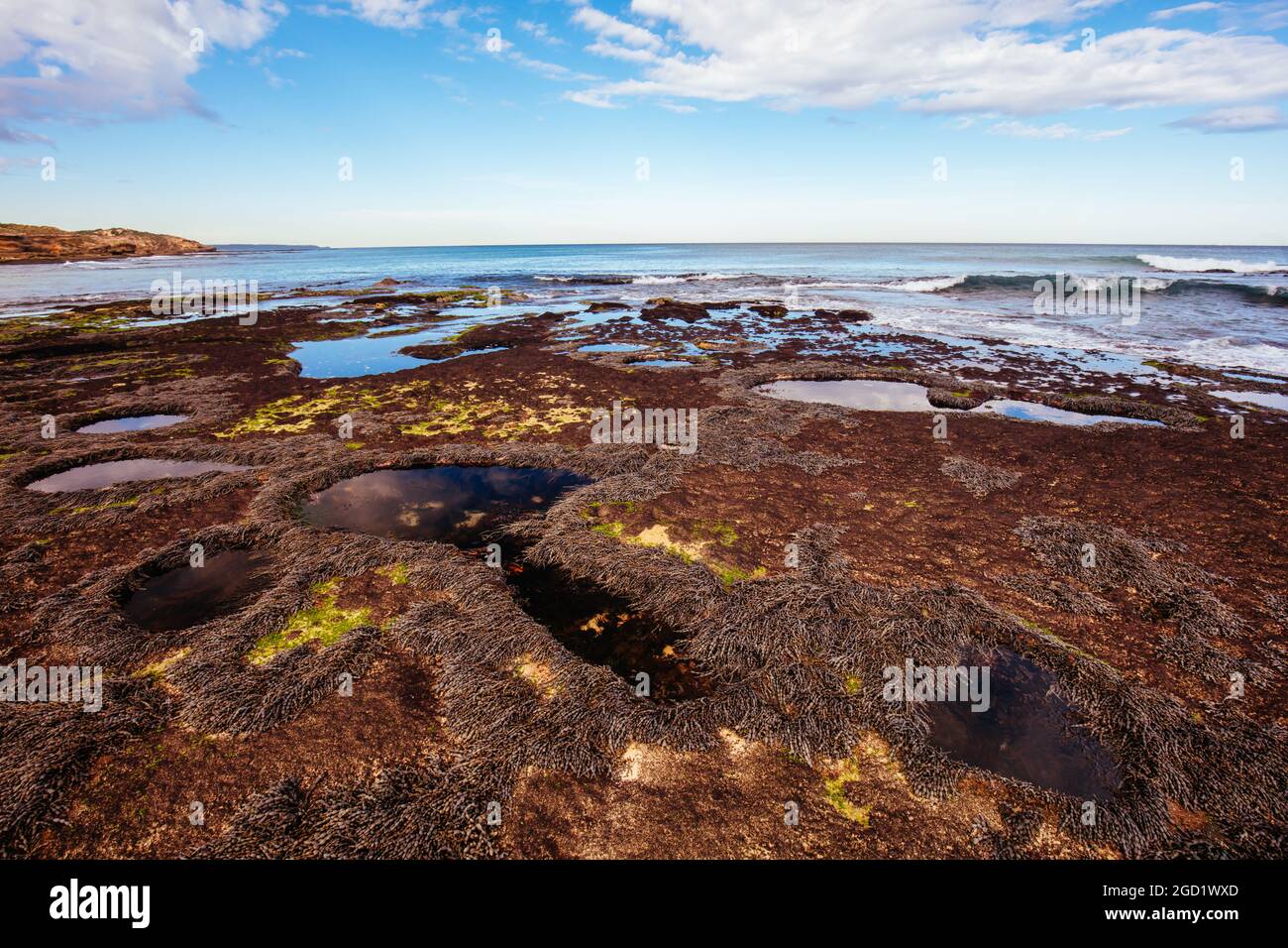 The lesser known Monforts Beach and its rockpool formations on a sunny ...