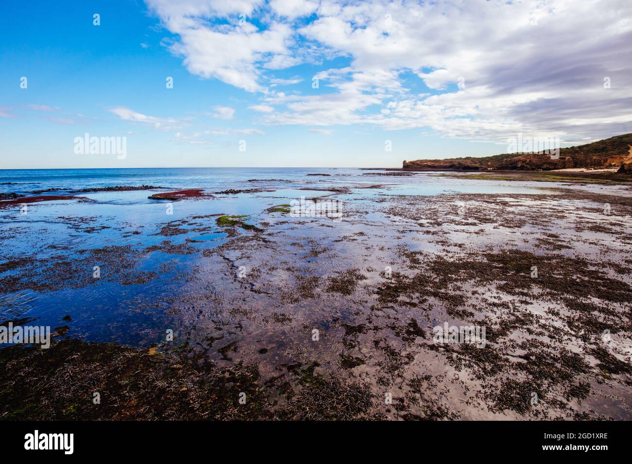 The lesser known Monforts Beach and its rockpool formations on a sunny ...