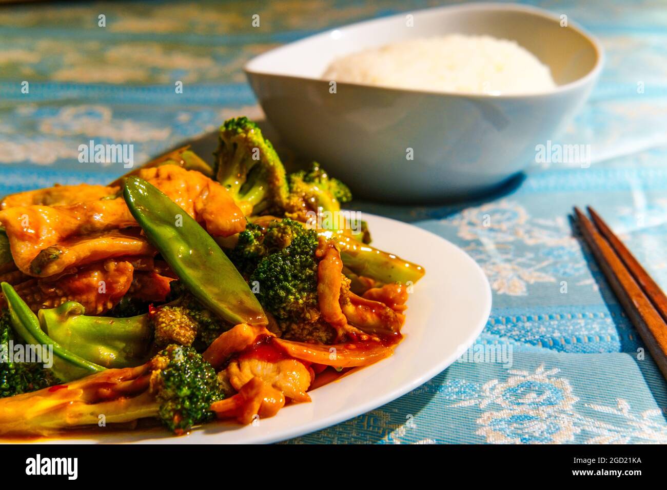 Chinese Hunan style spicy chicken with mixed sauteed vegetables and ...