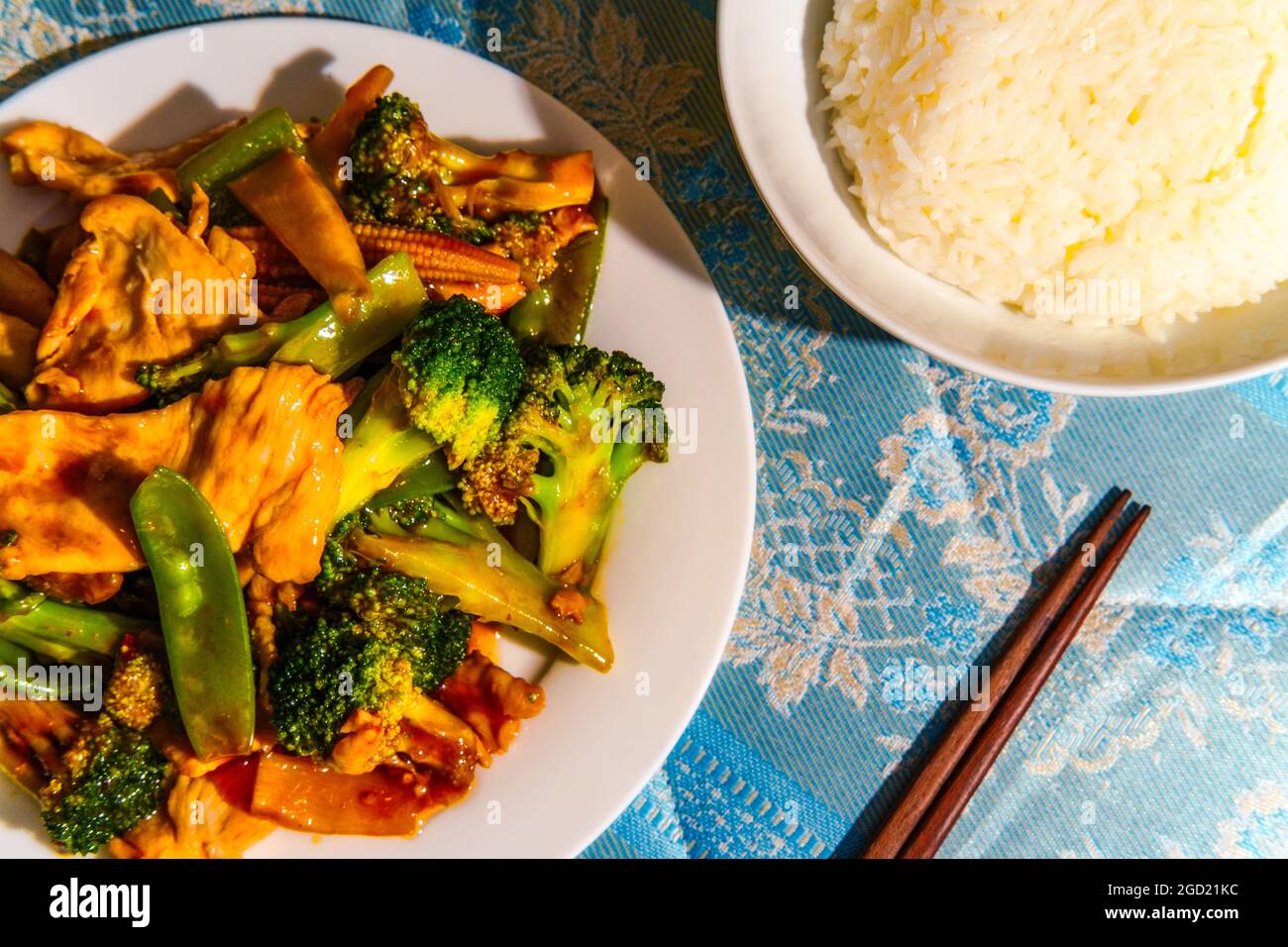 Chinese Hunan style spicy chicken with mixed sauteed vegetables and ...