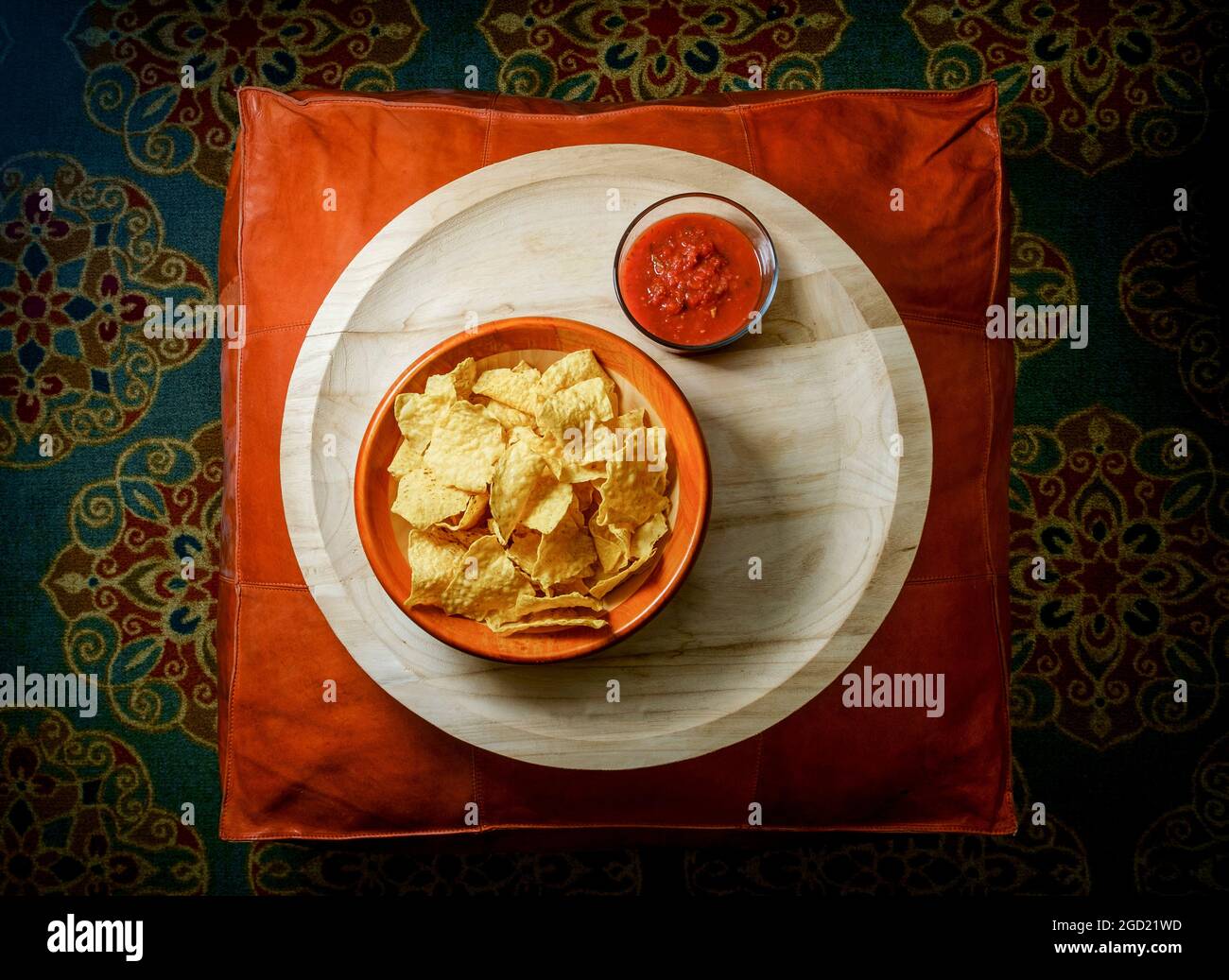 Mexican crispy tortilla chips with spicy red tomato salsa Stock Photo ...