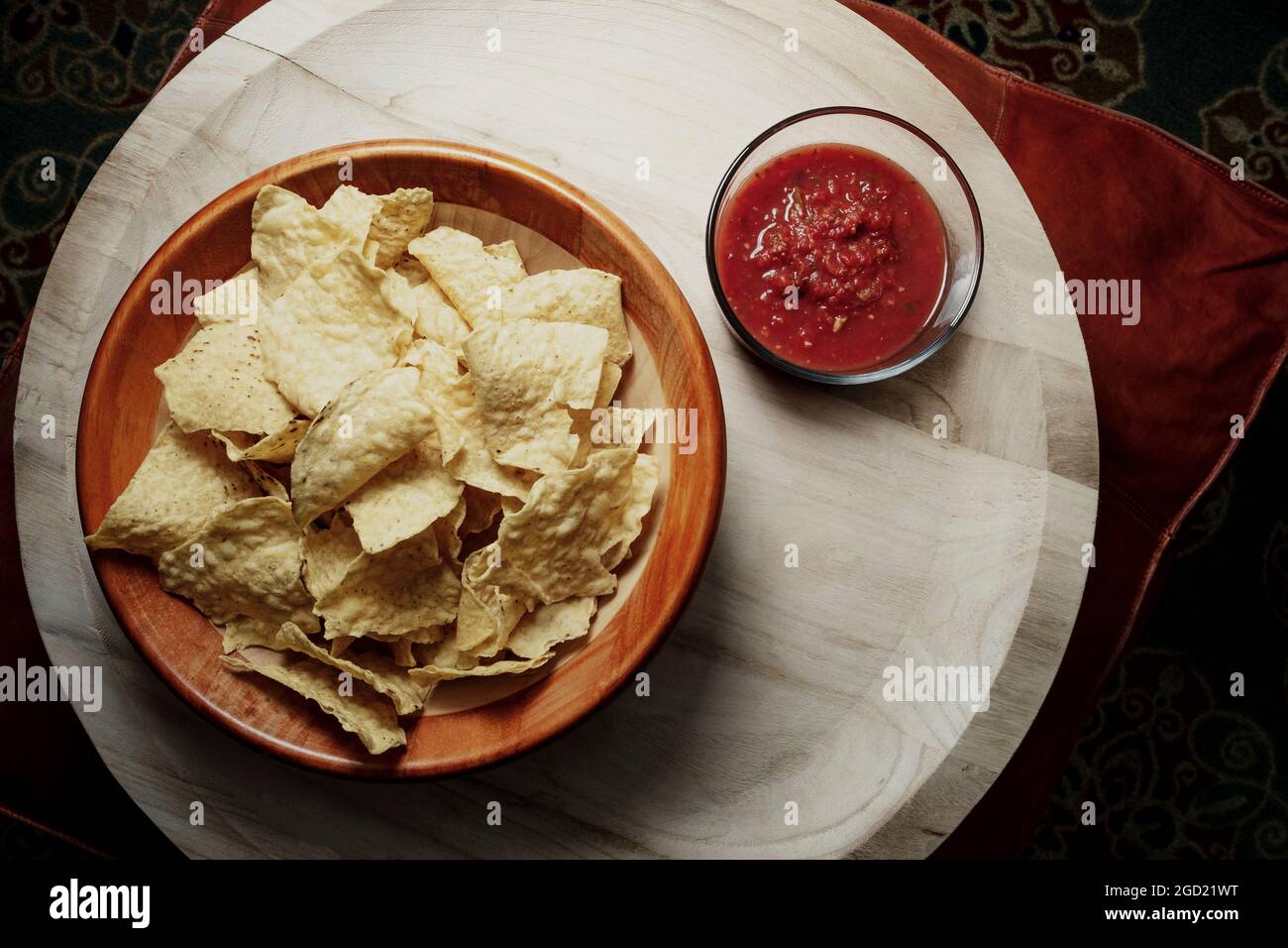 Mexican crispy tortilla chips with spicy red tomato salsa Stock Photo ...