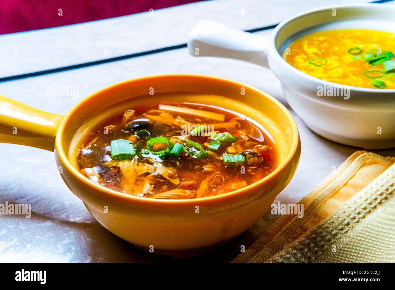 Authentic chinese food wonton soup garnished with sliced green onion ...
