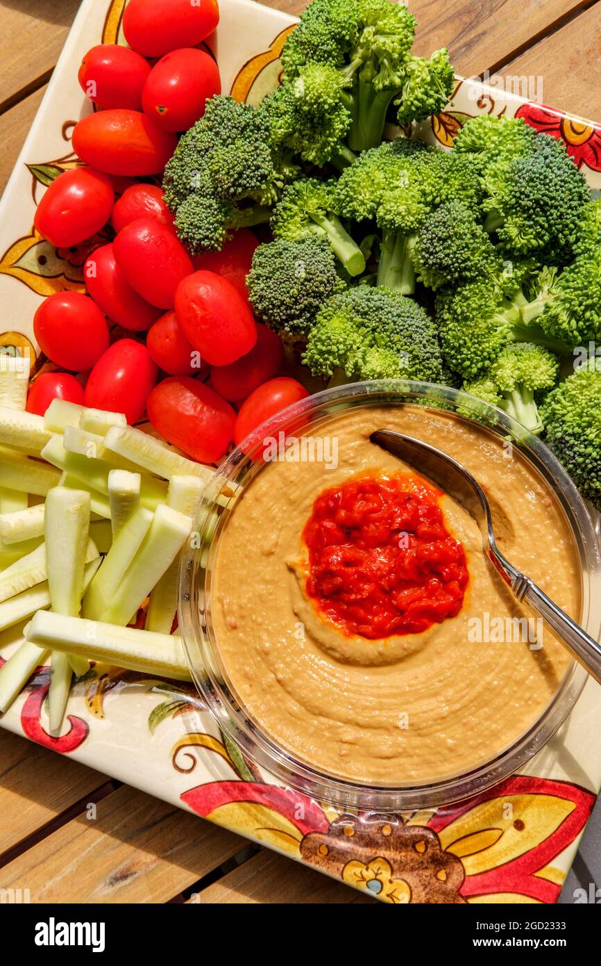 Vegetable platter with roasted red pepper hummus for dipping Stock ...
