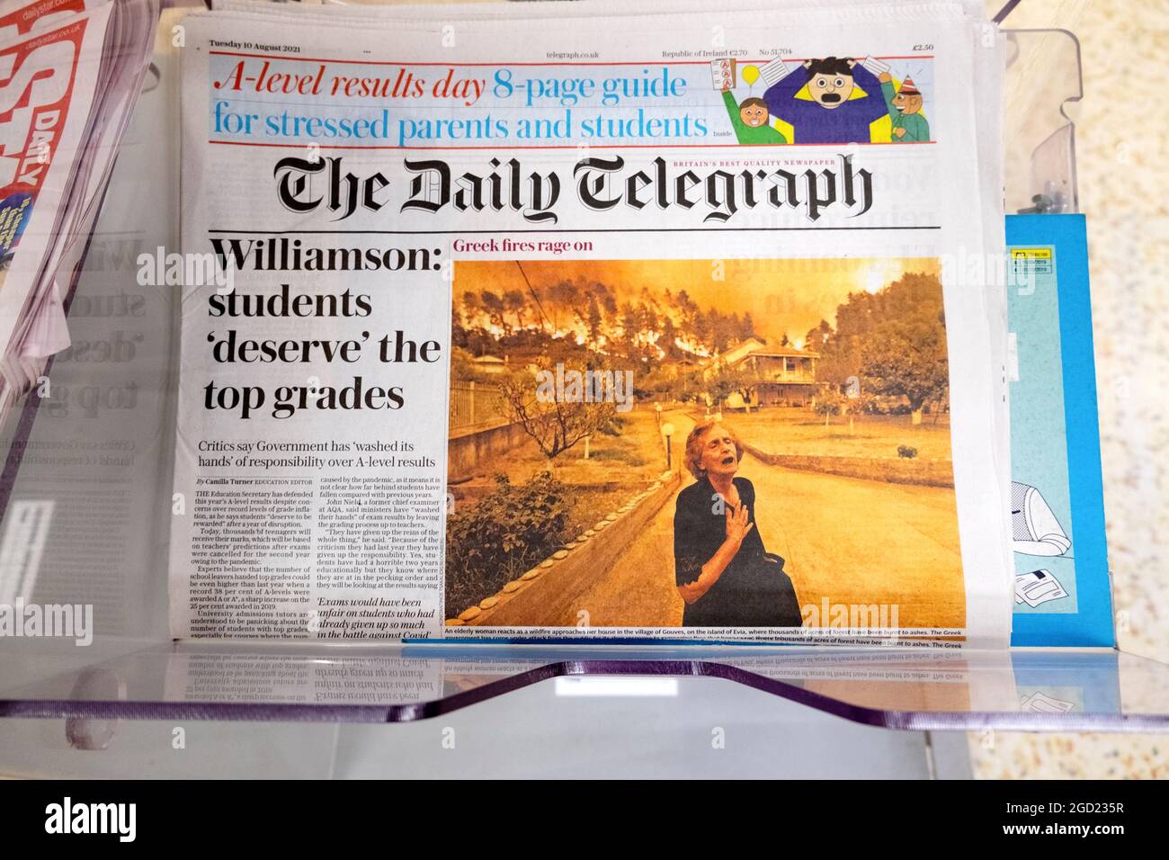 Daily Telegraph newspaper headline front page "Greek fires rage on" and ...